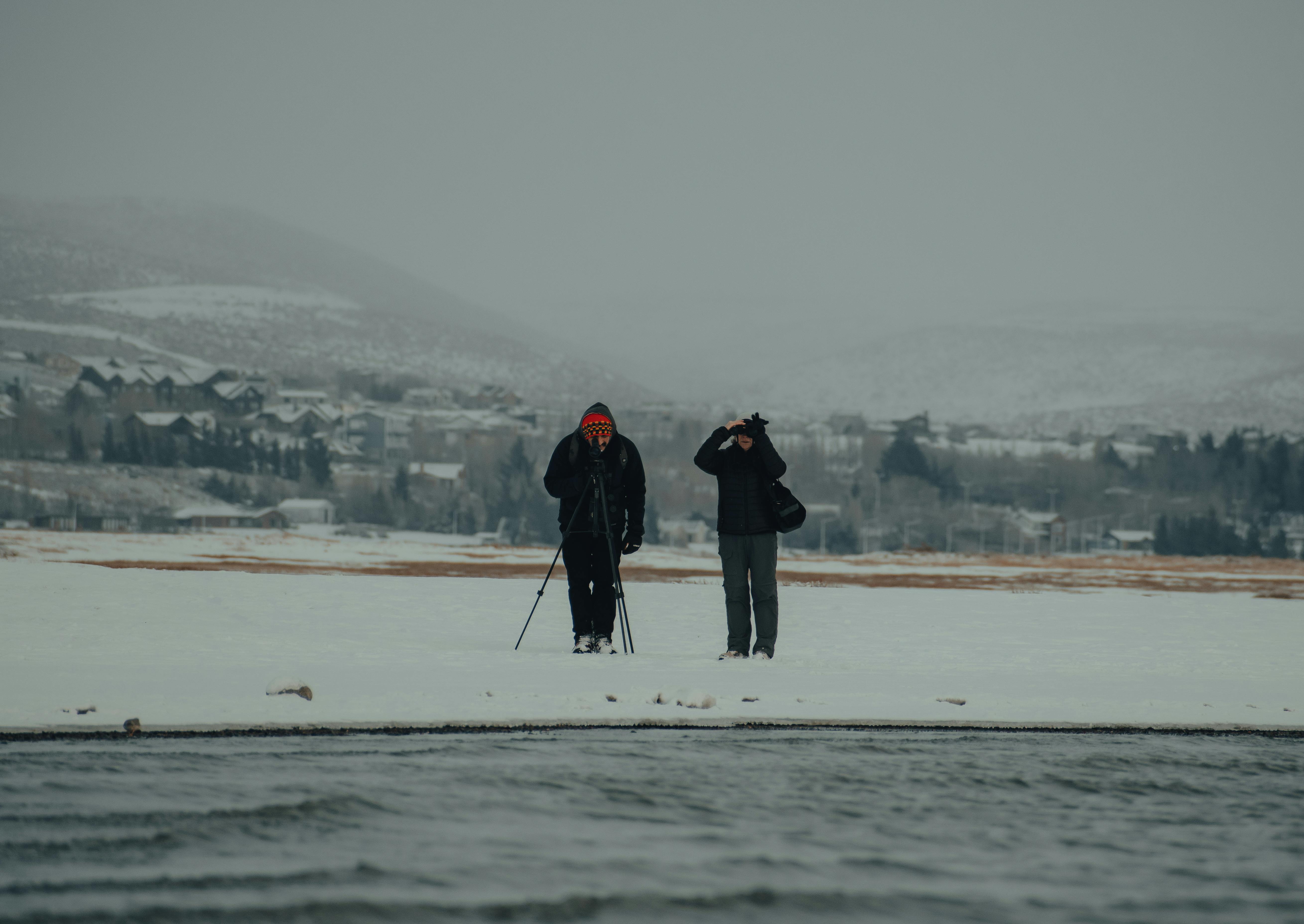 Two People Standing on Ice · Free Stock Photo