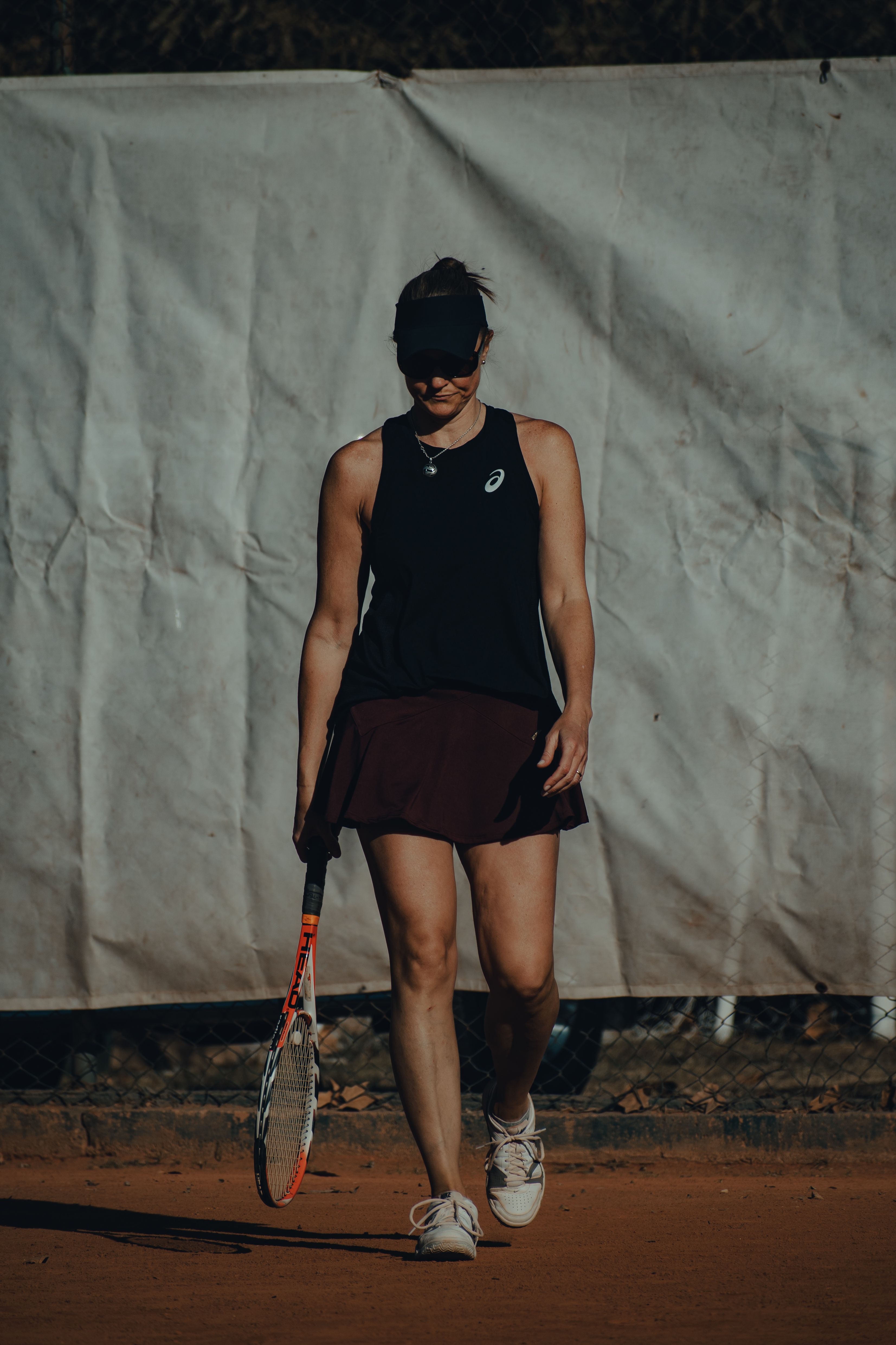 Close-up Photo of Man Standing on Tennis Court · Free Stock Photo