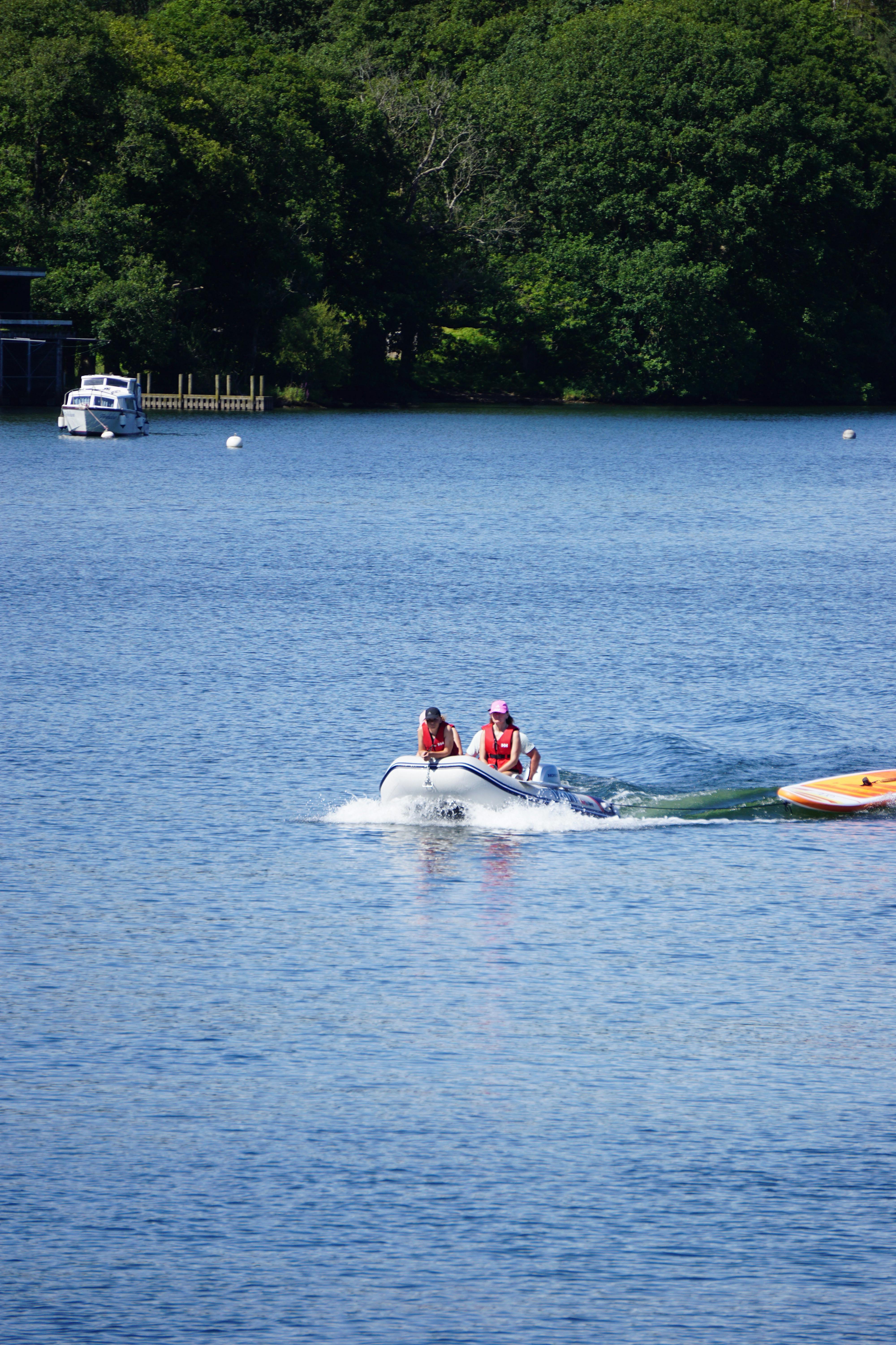 People on Raft on Lake · Free Stock Photo