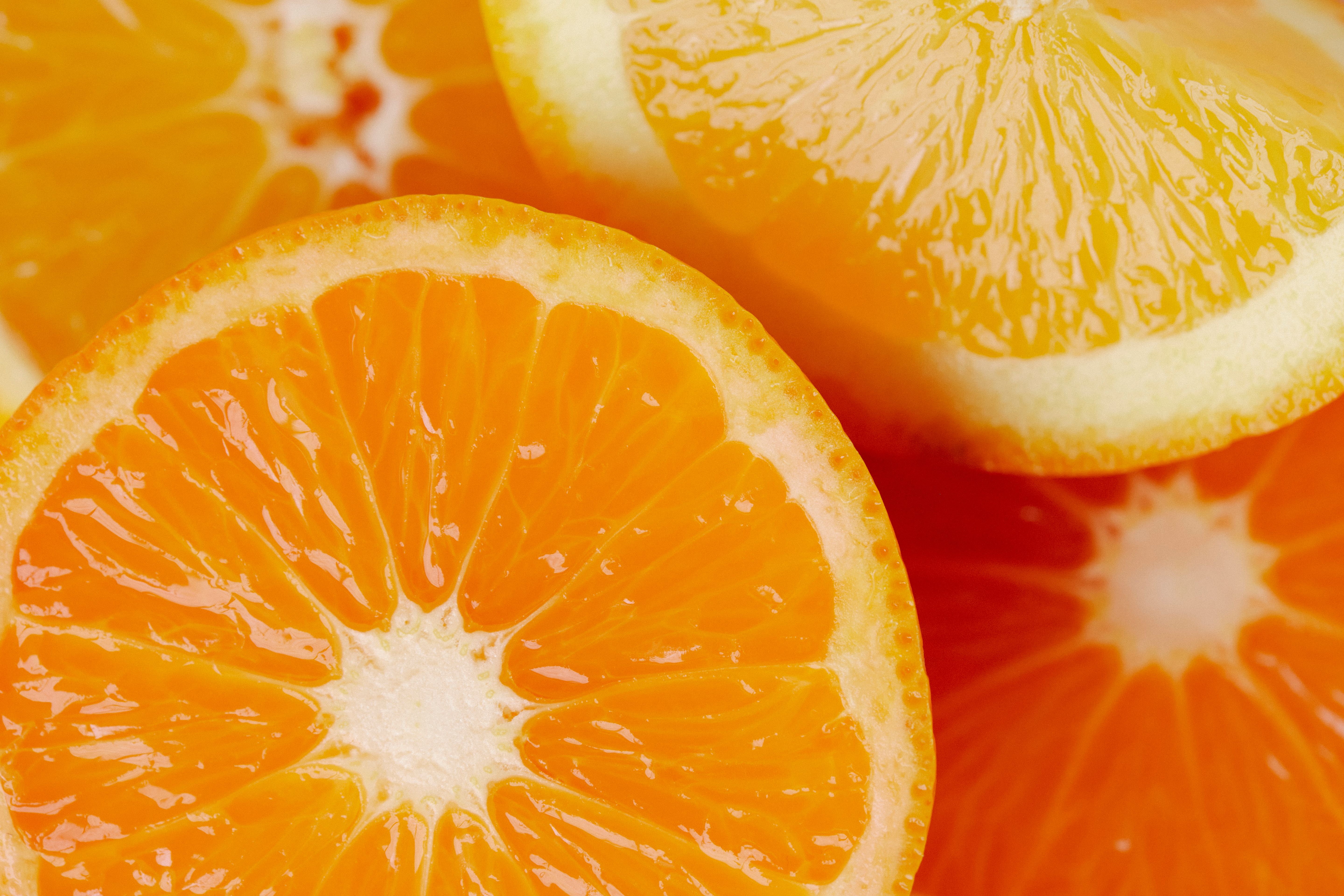 Close-up Photo of a Sliced Citrus Fruit · Free Stock Photo