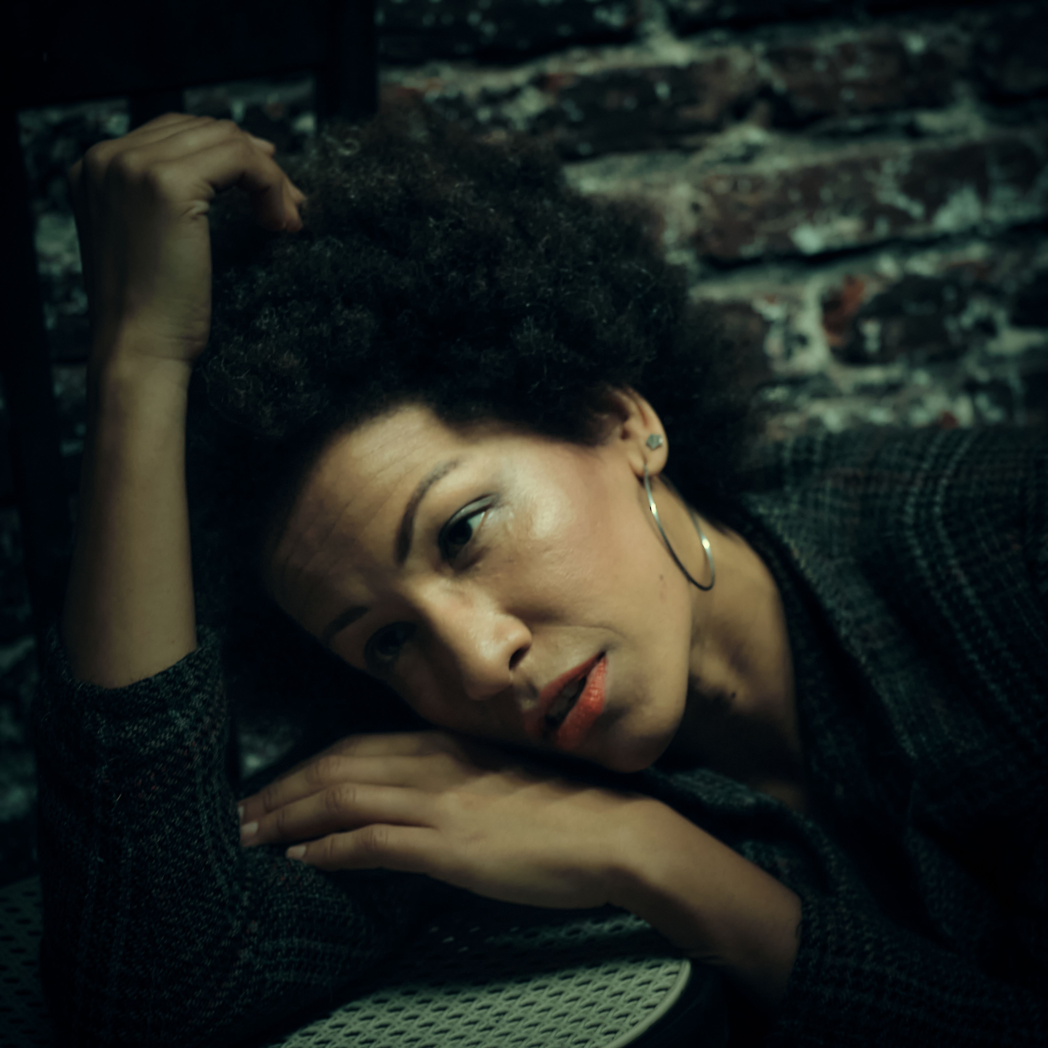 Portrait of Woman Sitting by Table in Office · Free Stock Photo