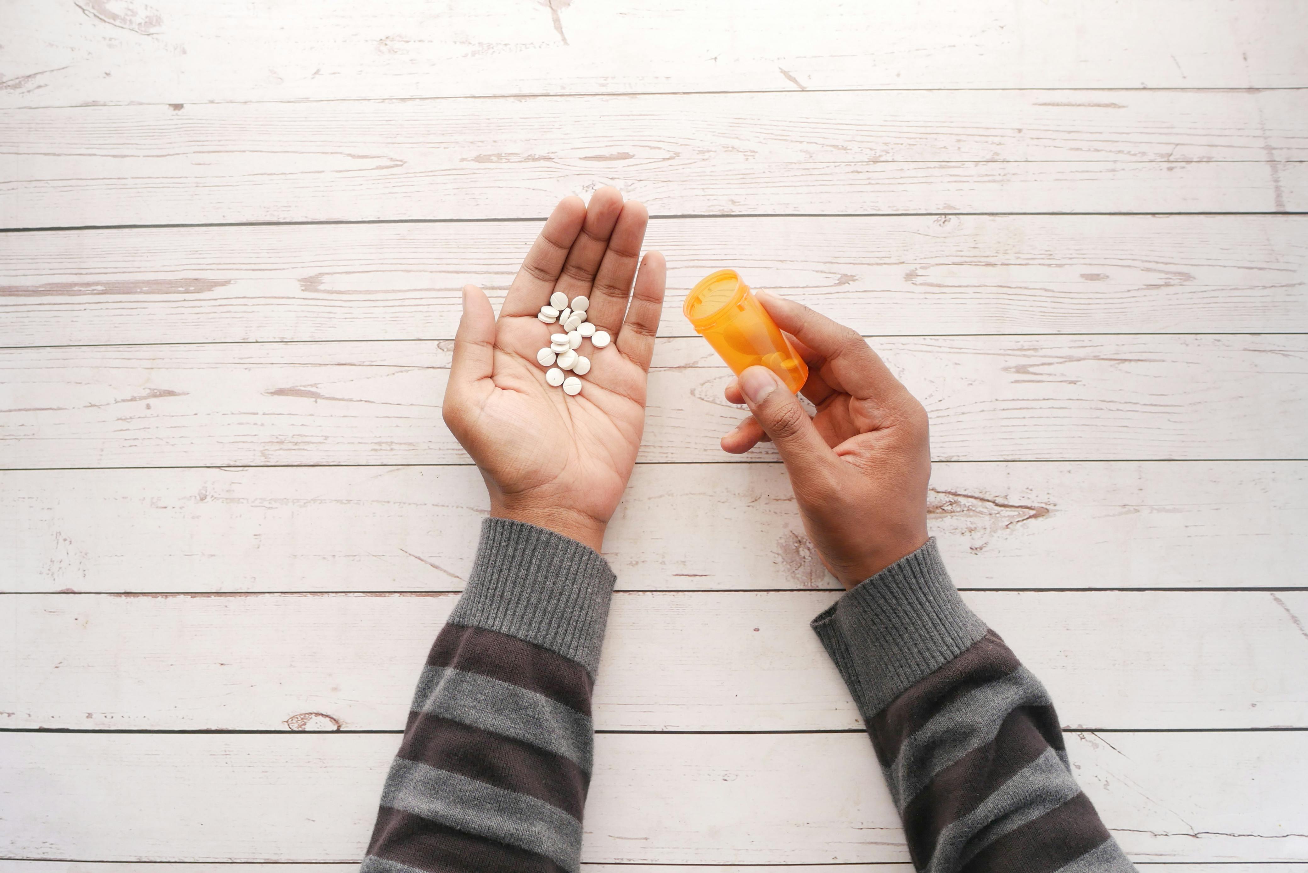 Medication on a Person's Palm · Free Stock Photo