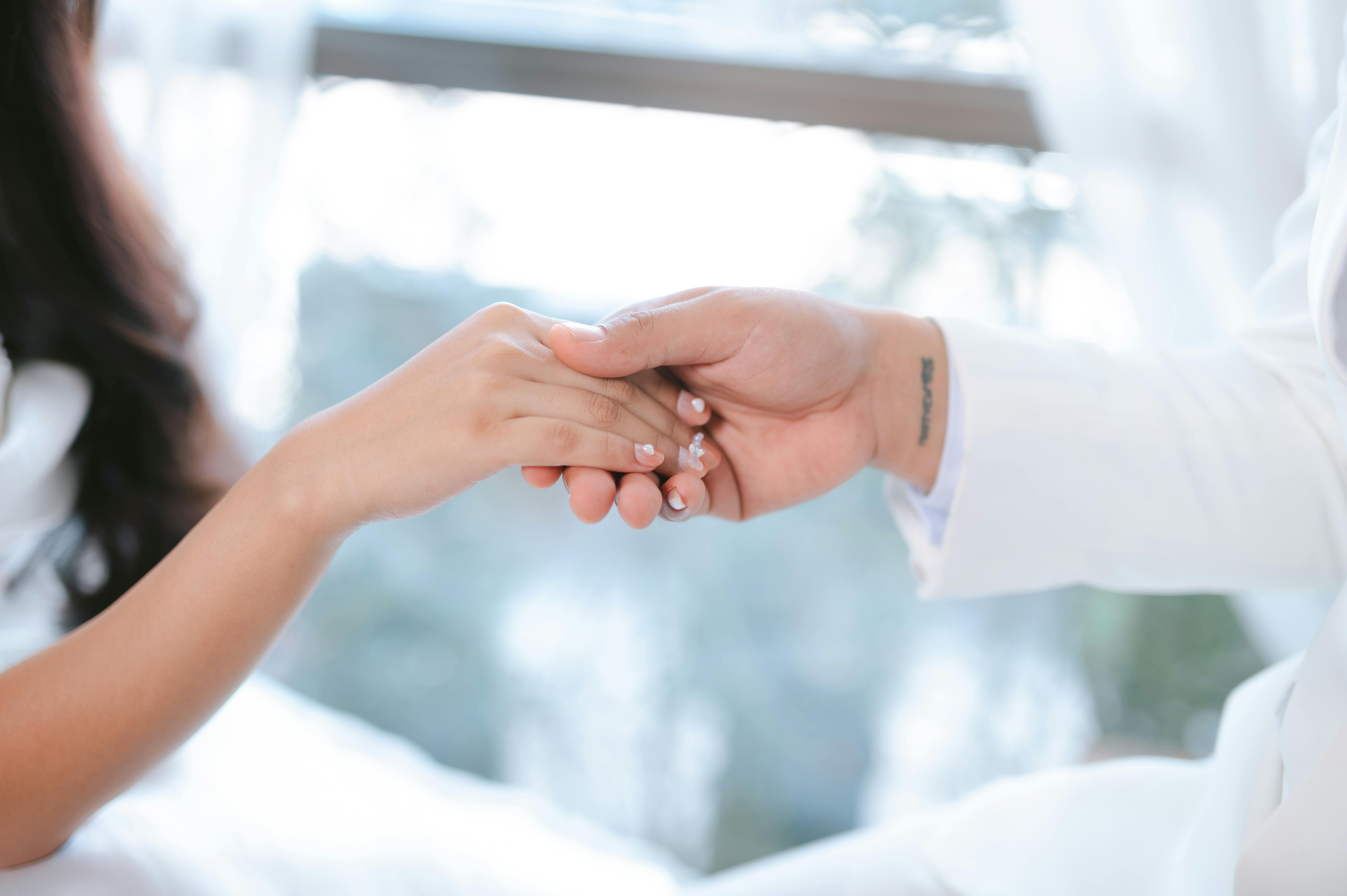 Man and Woman Interlocking Index Fingers With Anchor Tattoos · Free ...