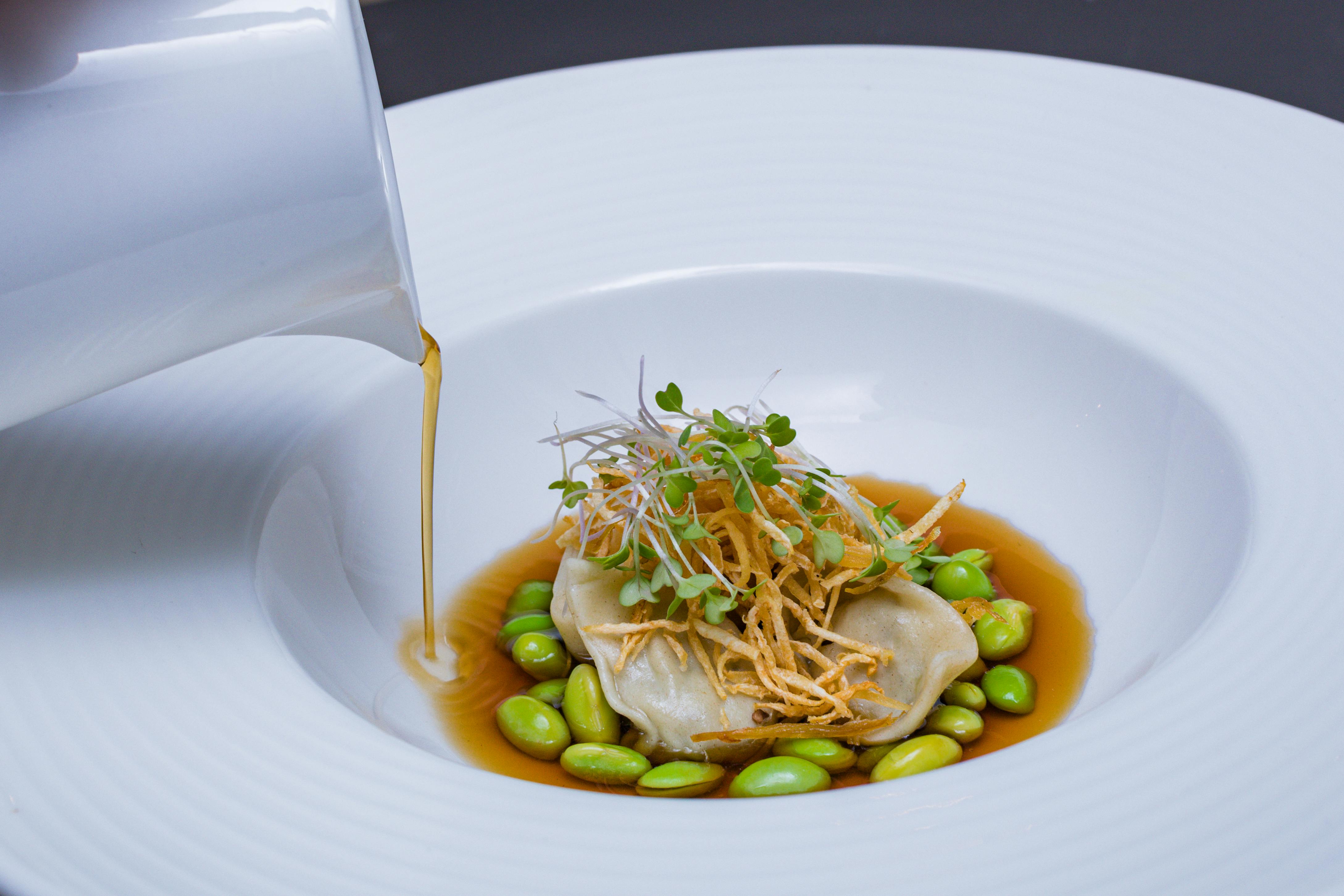 Pouring Liquid to Meal · Free Stock Photo