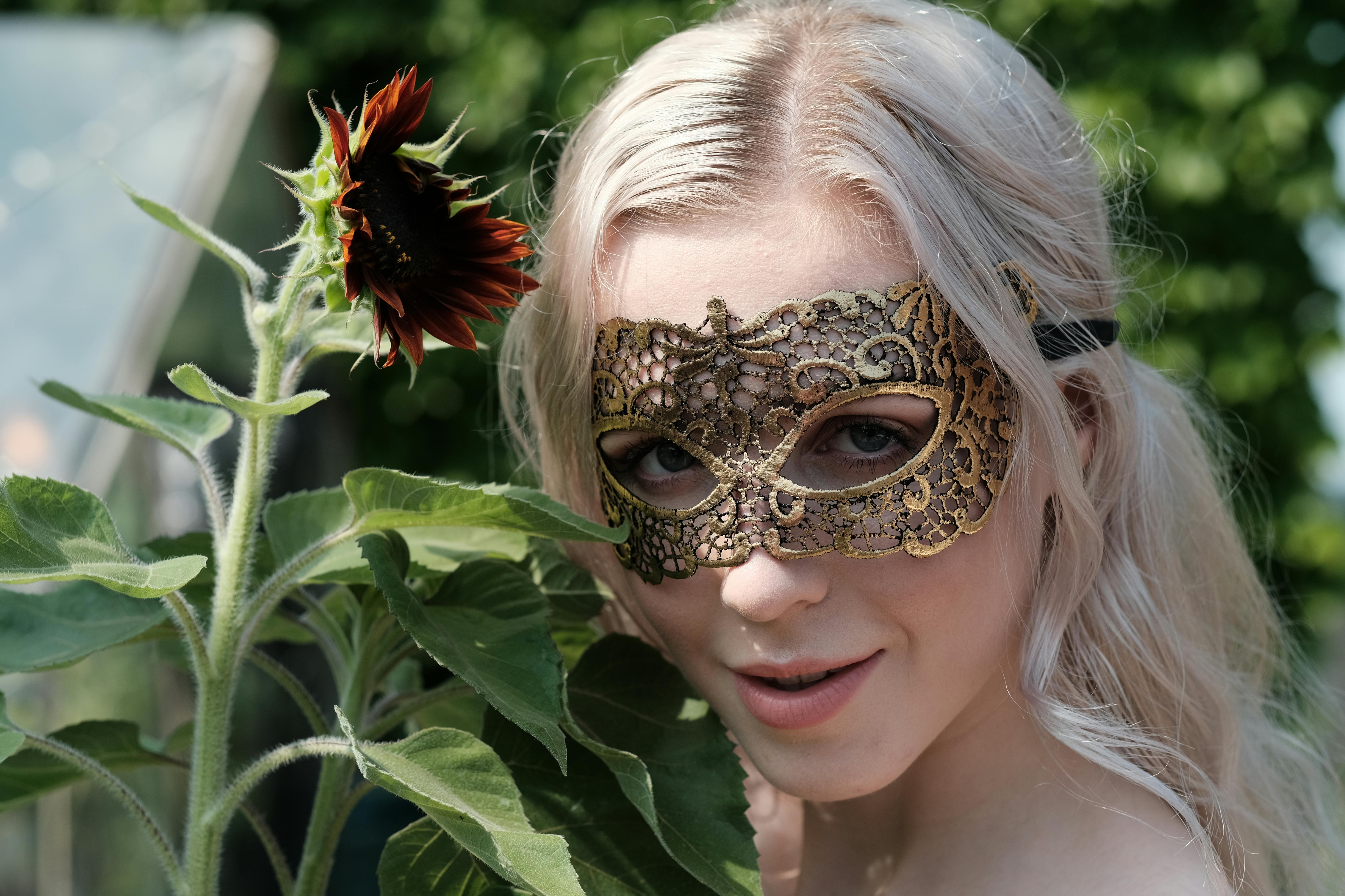 Purple Masquerade Mask Near Banners · Free Stock Photo