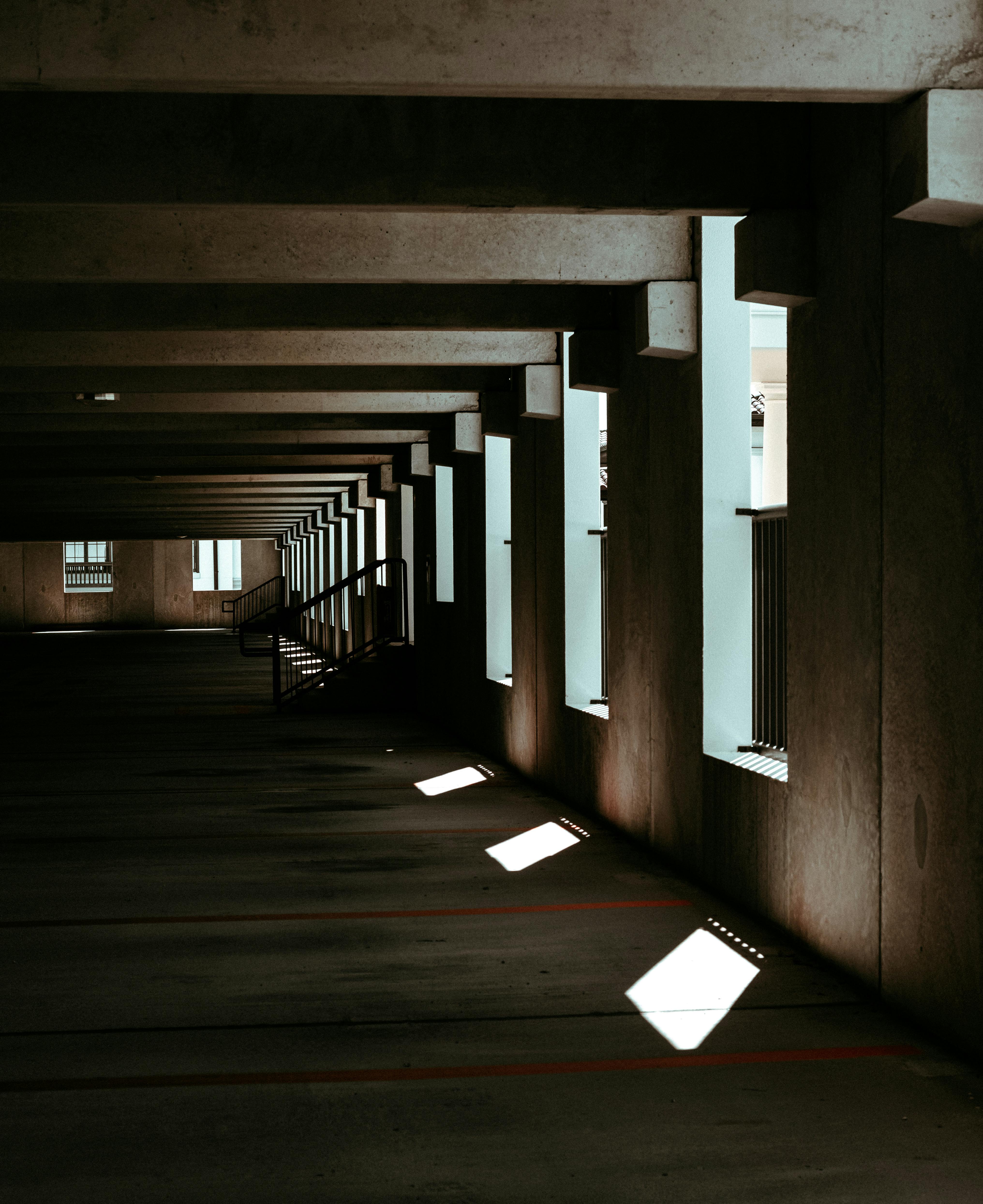 Empty Hallway of a Concrete Building · Free Stock Photo