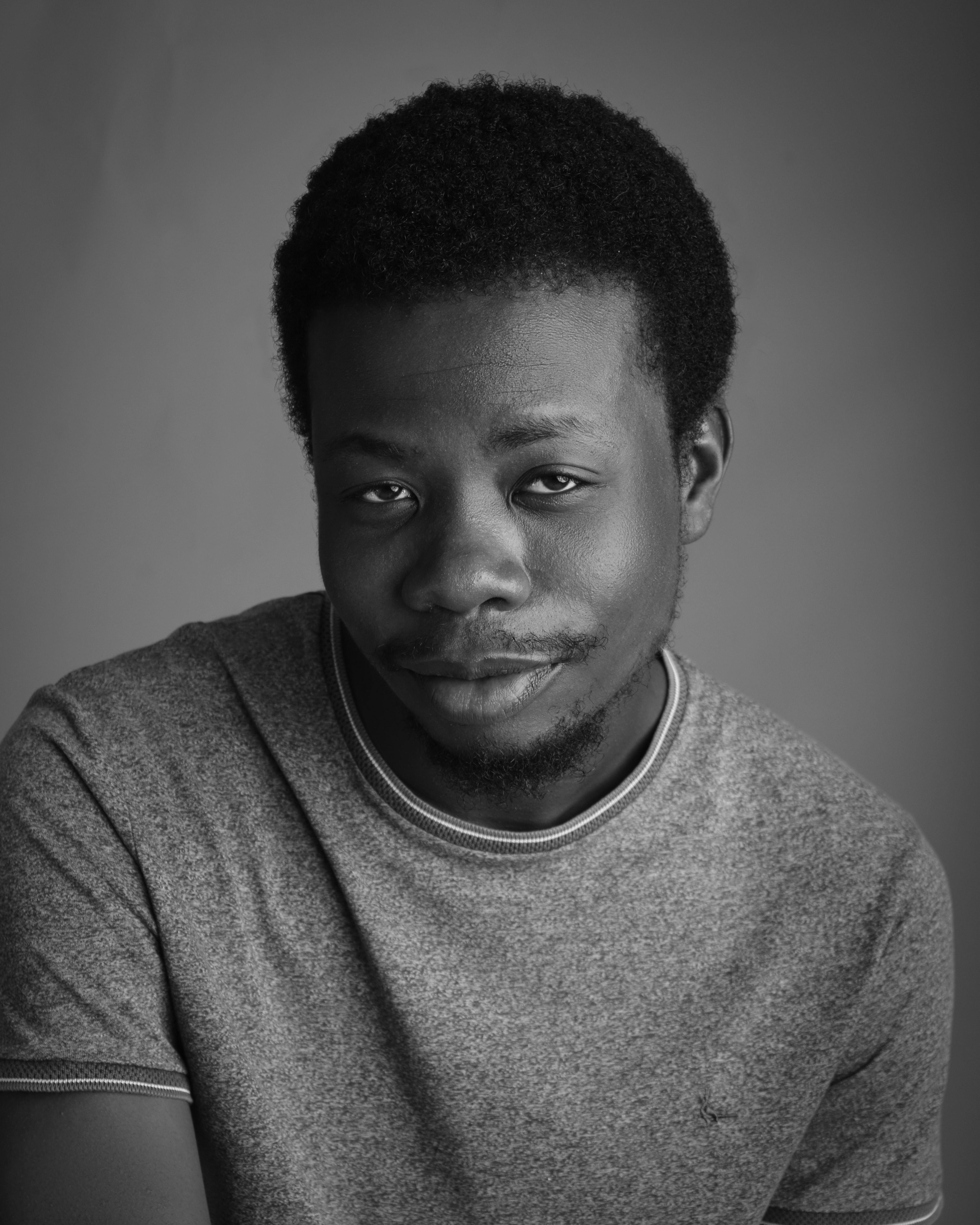 Grayscale Photography of a Man Looking at the Camera · Free Stock Photo