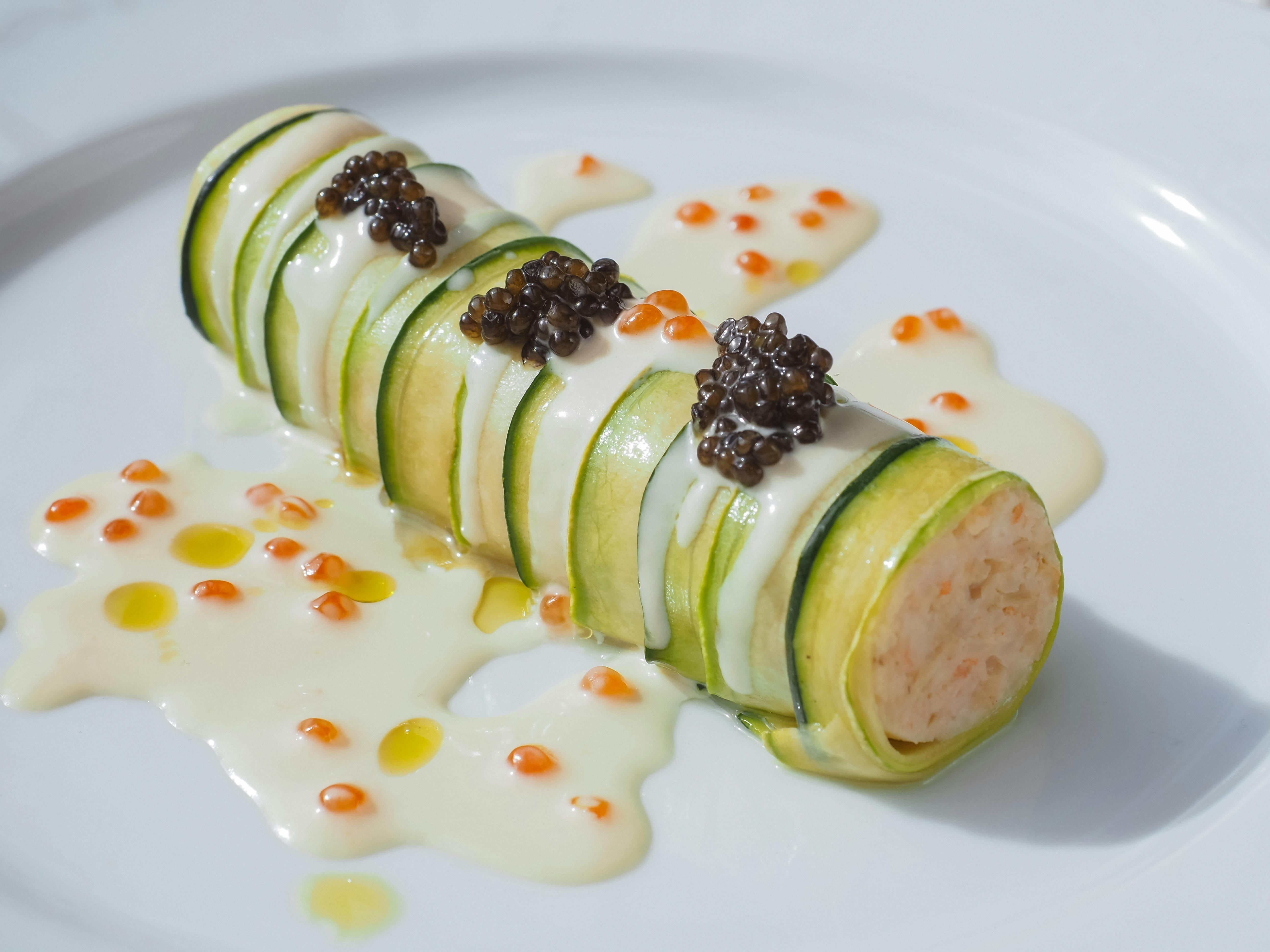 Rolled Food with Cream on Plate · Free Stock Photo