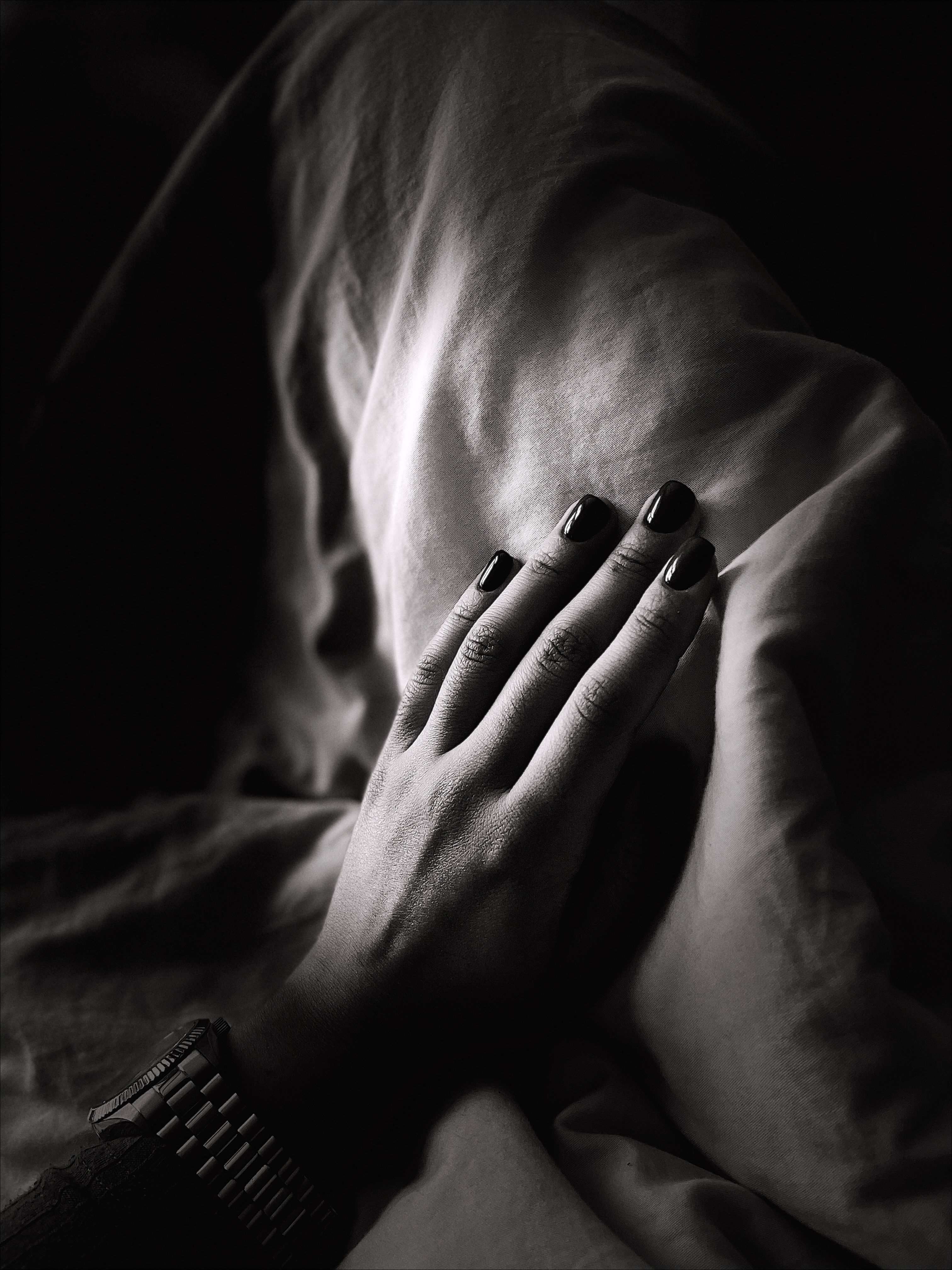 Grayscale Photo of Person's Hand · Free Stock Photo