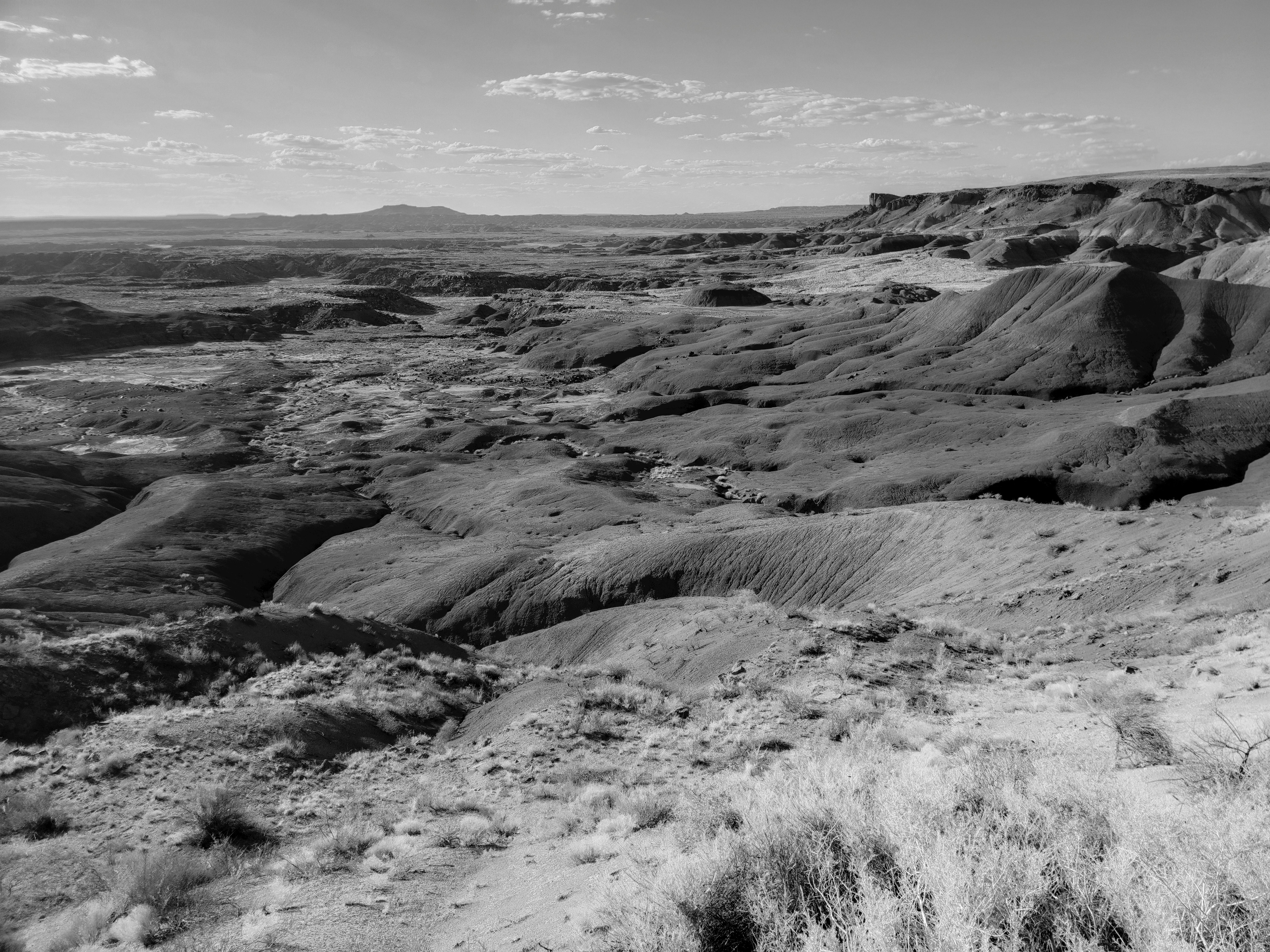 Gray Scale Image of Stone Tower · Free Stock Photo