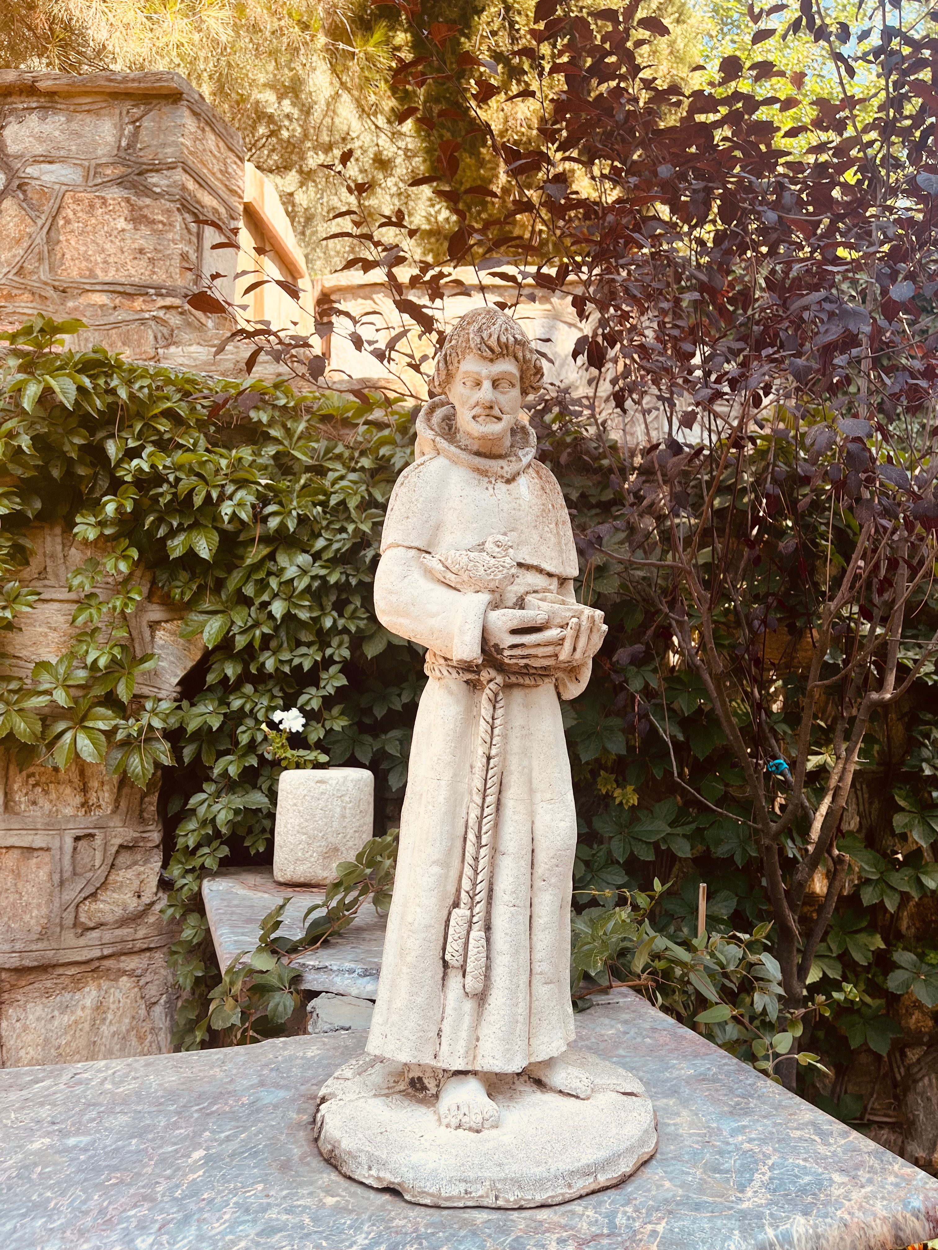 Brown Concrete Statue · Free Stock Photo
