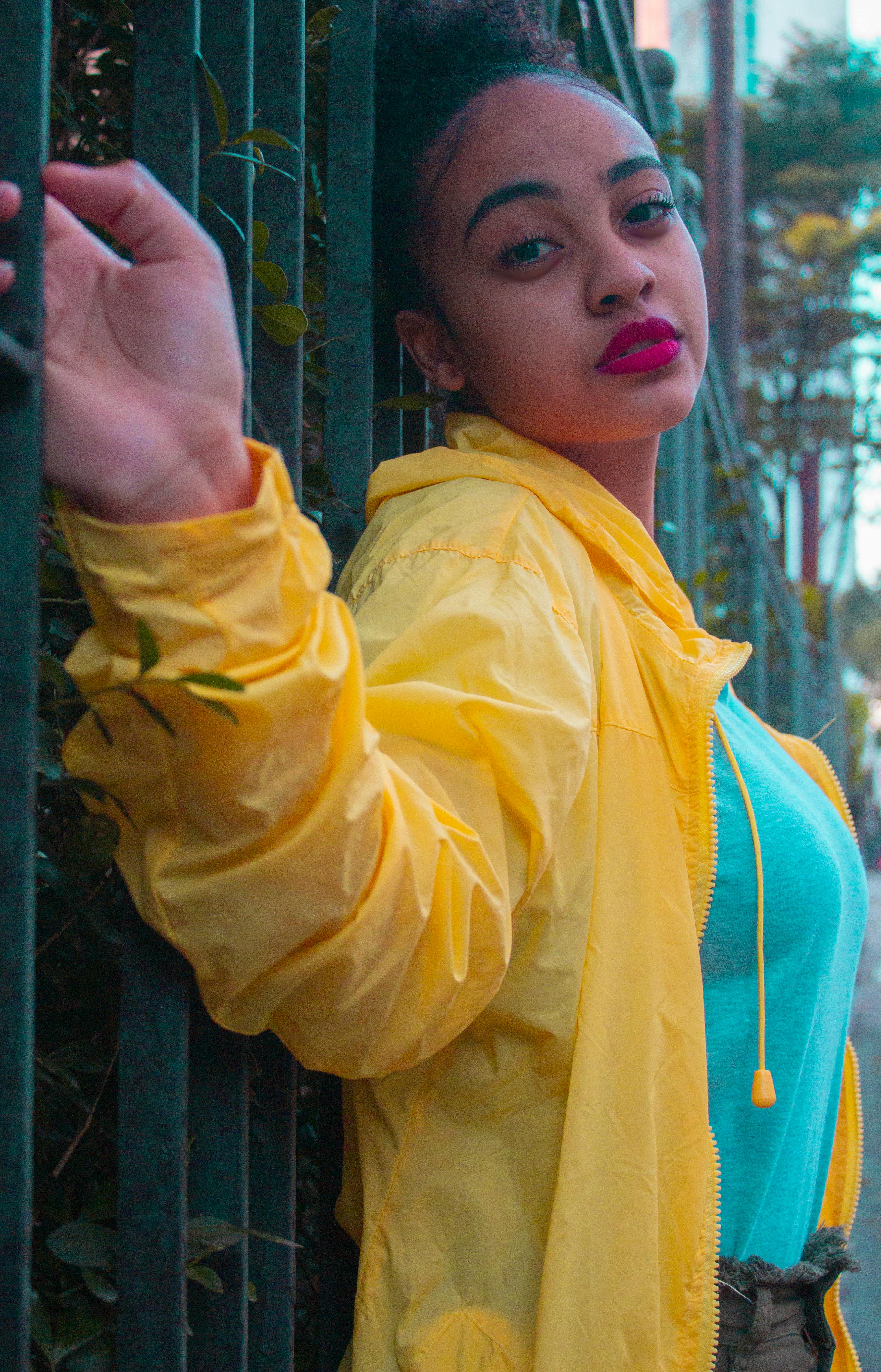 A Woman Wearing Yellow Jacket · Free Stock Photo