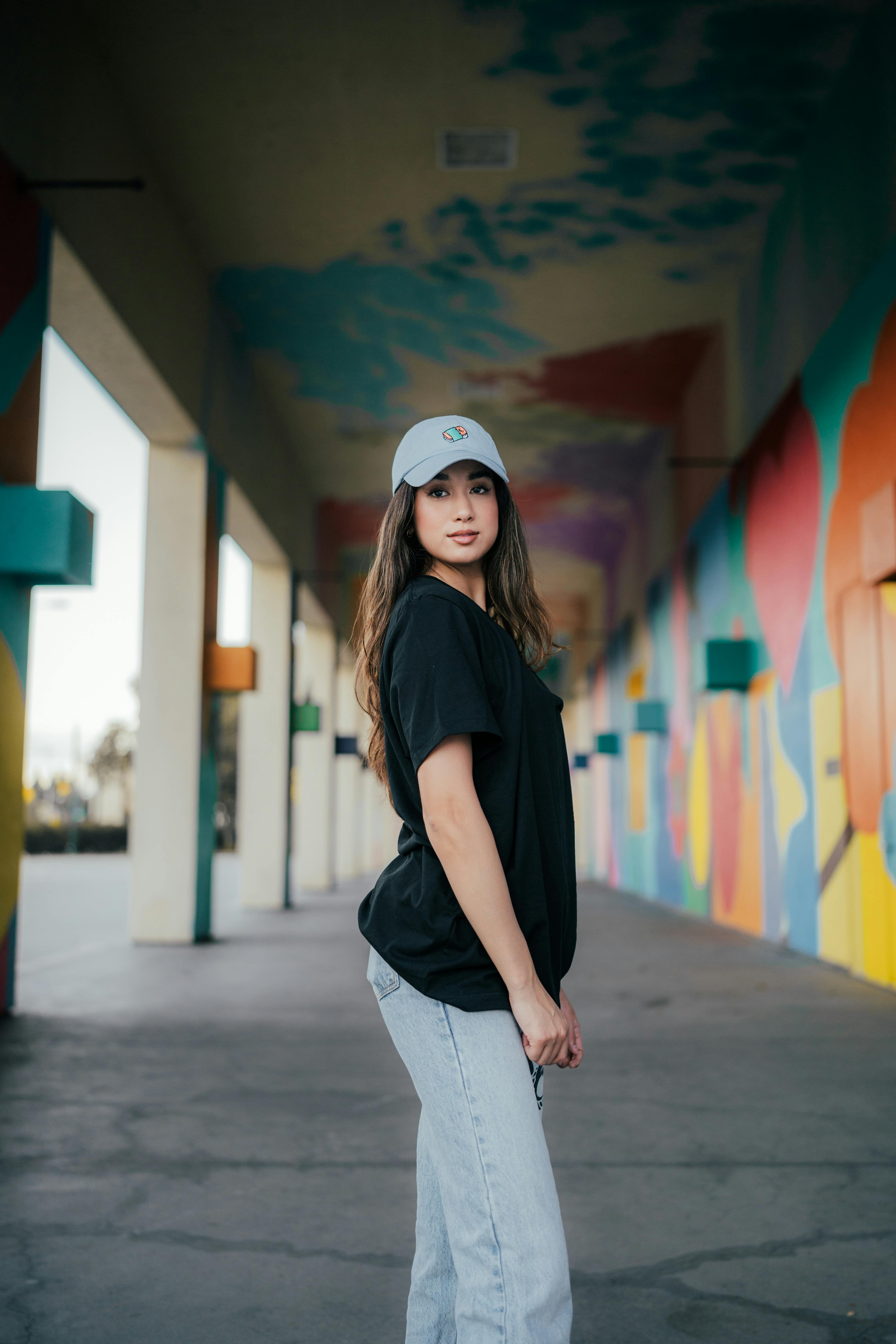 Woman in Cap Posing · Free Stock Photo
