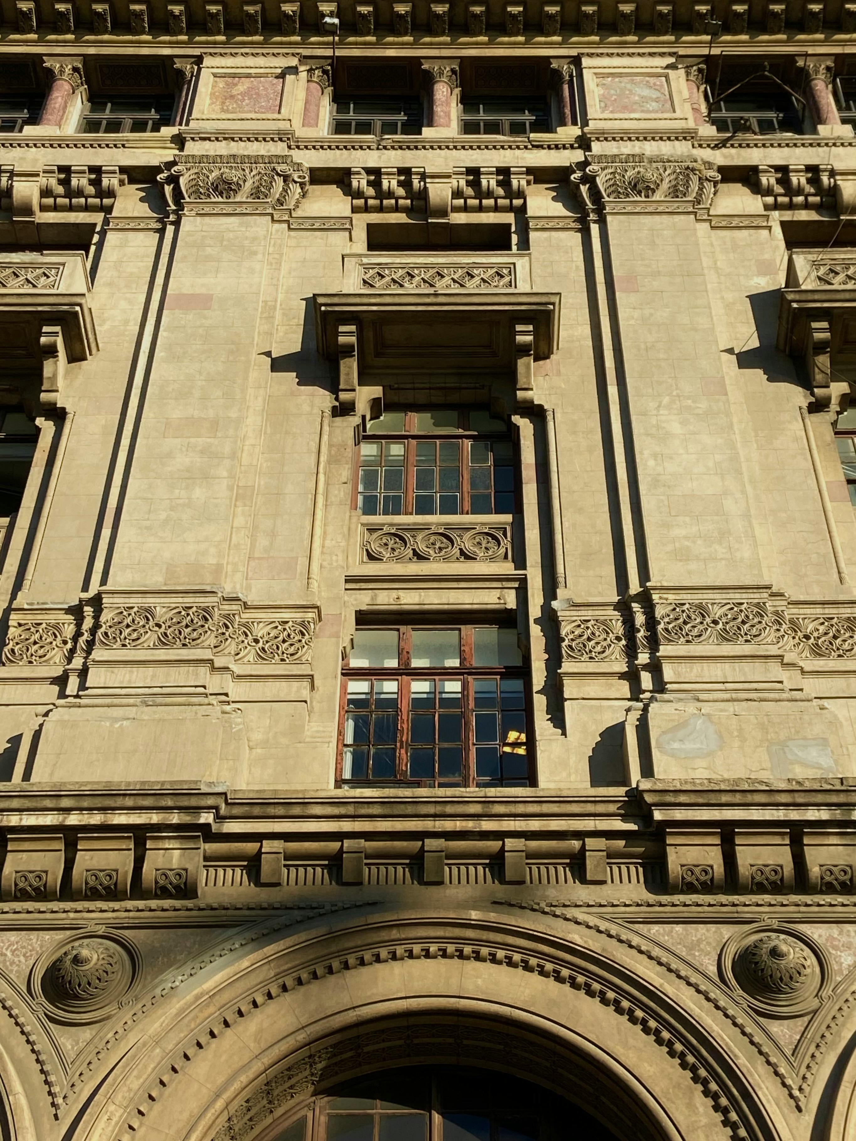 Low-Angle Shot of a Concrete Building · Free Stock Photo