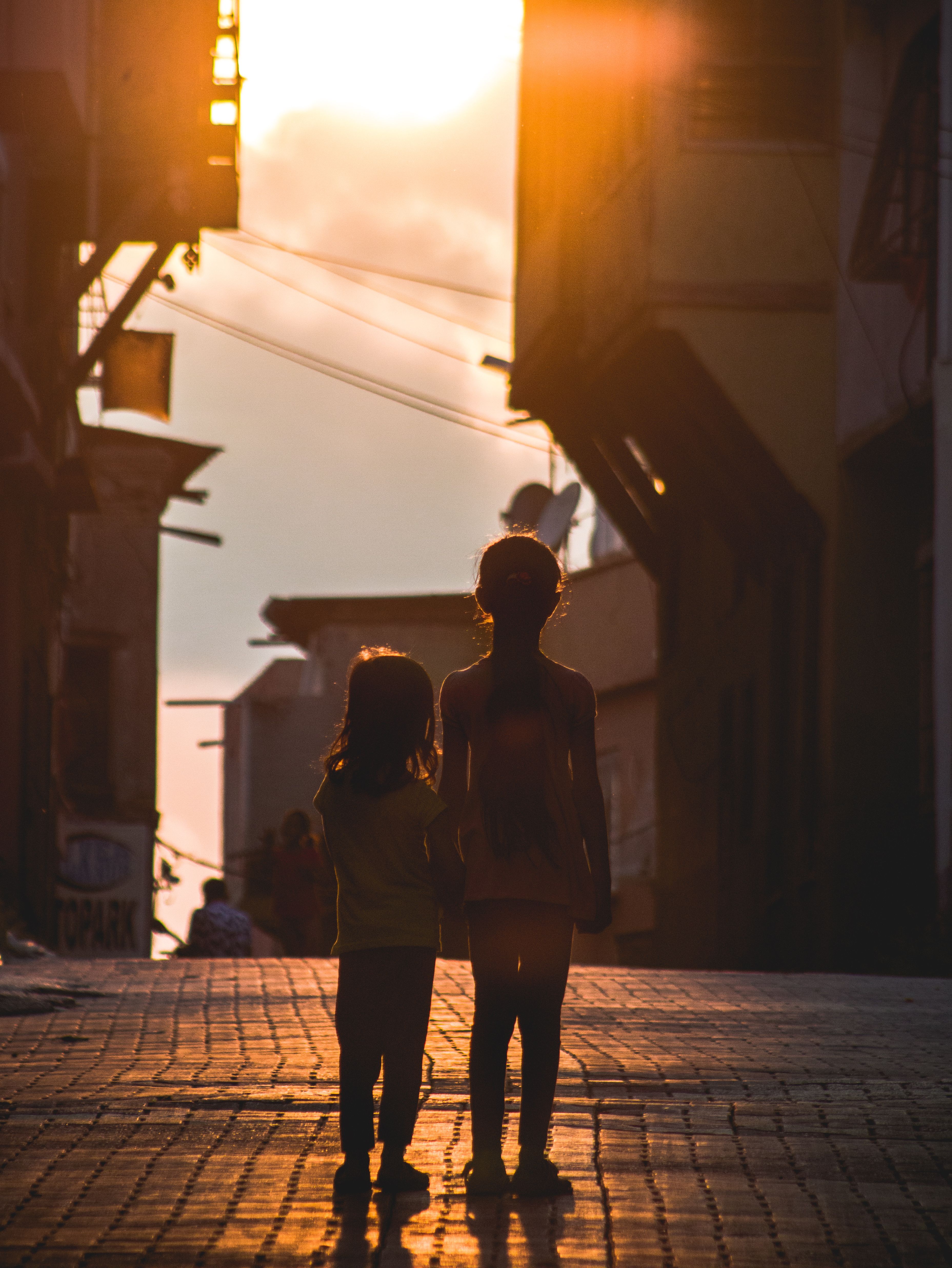 Back View of Sisters Holding Hands · Free Stock Photo