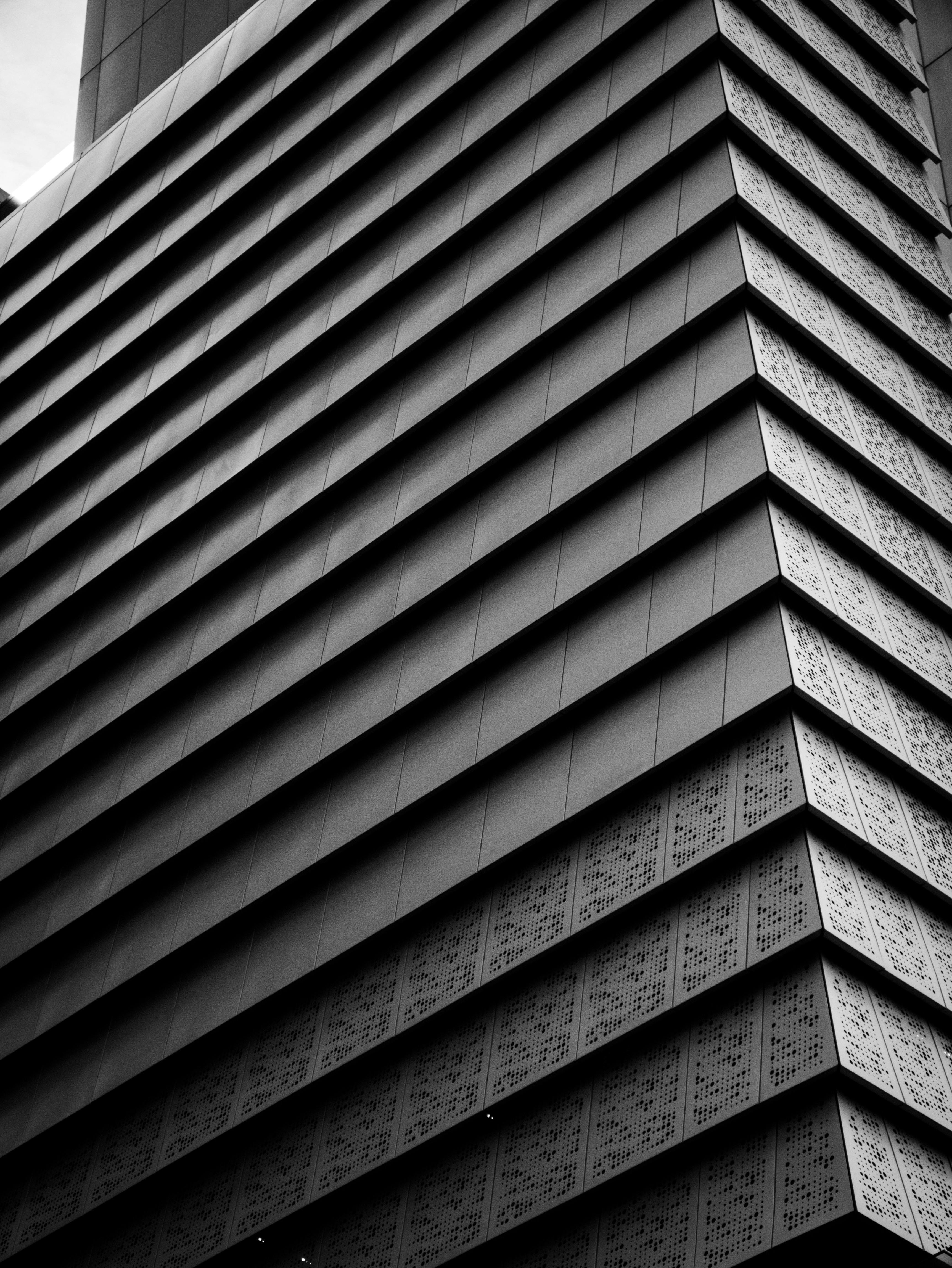 Grayscale Photo of Concrete Pillars · Free Stock Photo