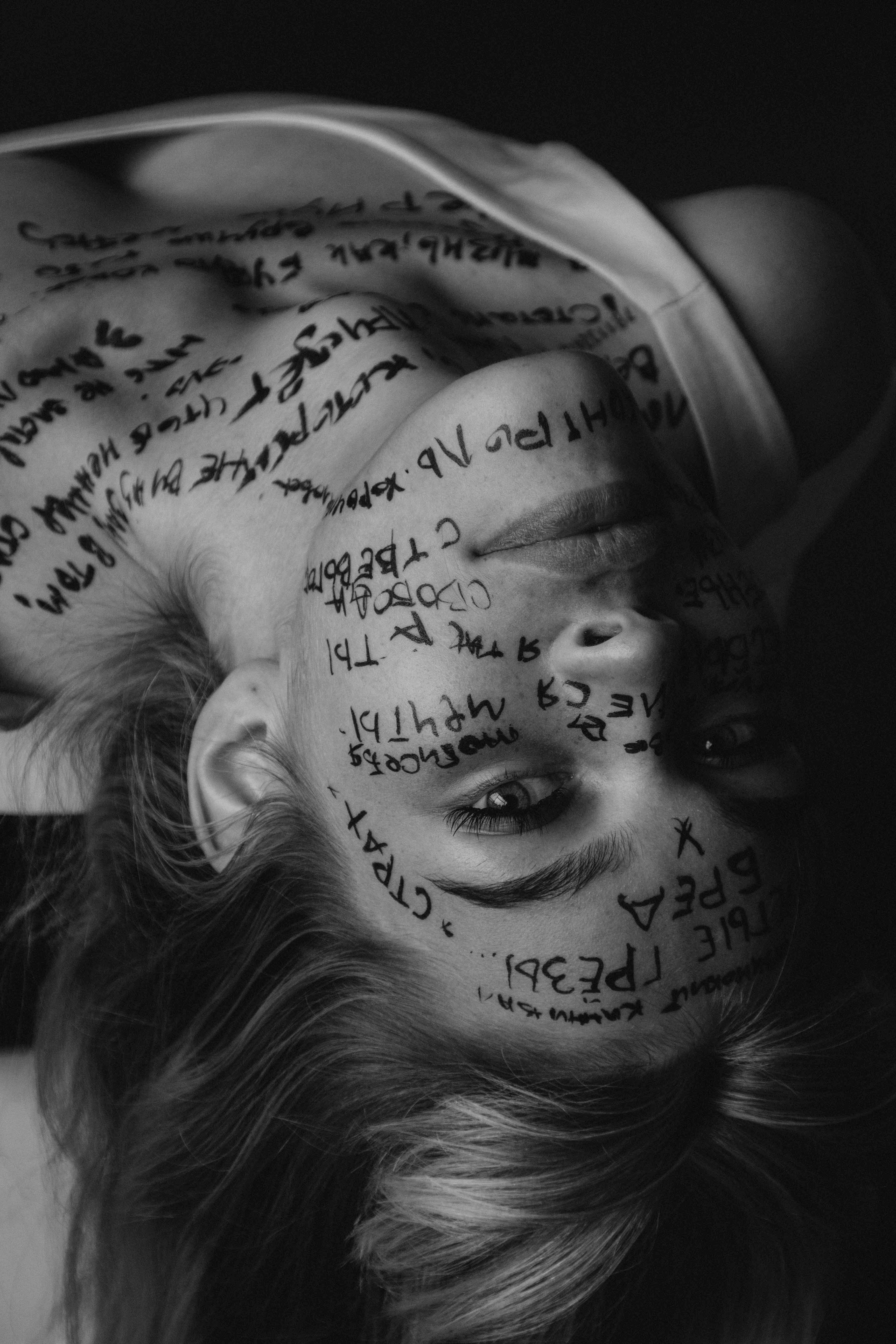 Grayscale Photo of Woman With Face Paint · Free Stock Photo