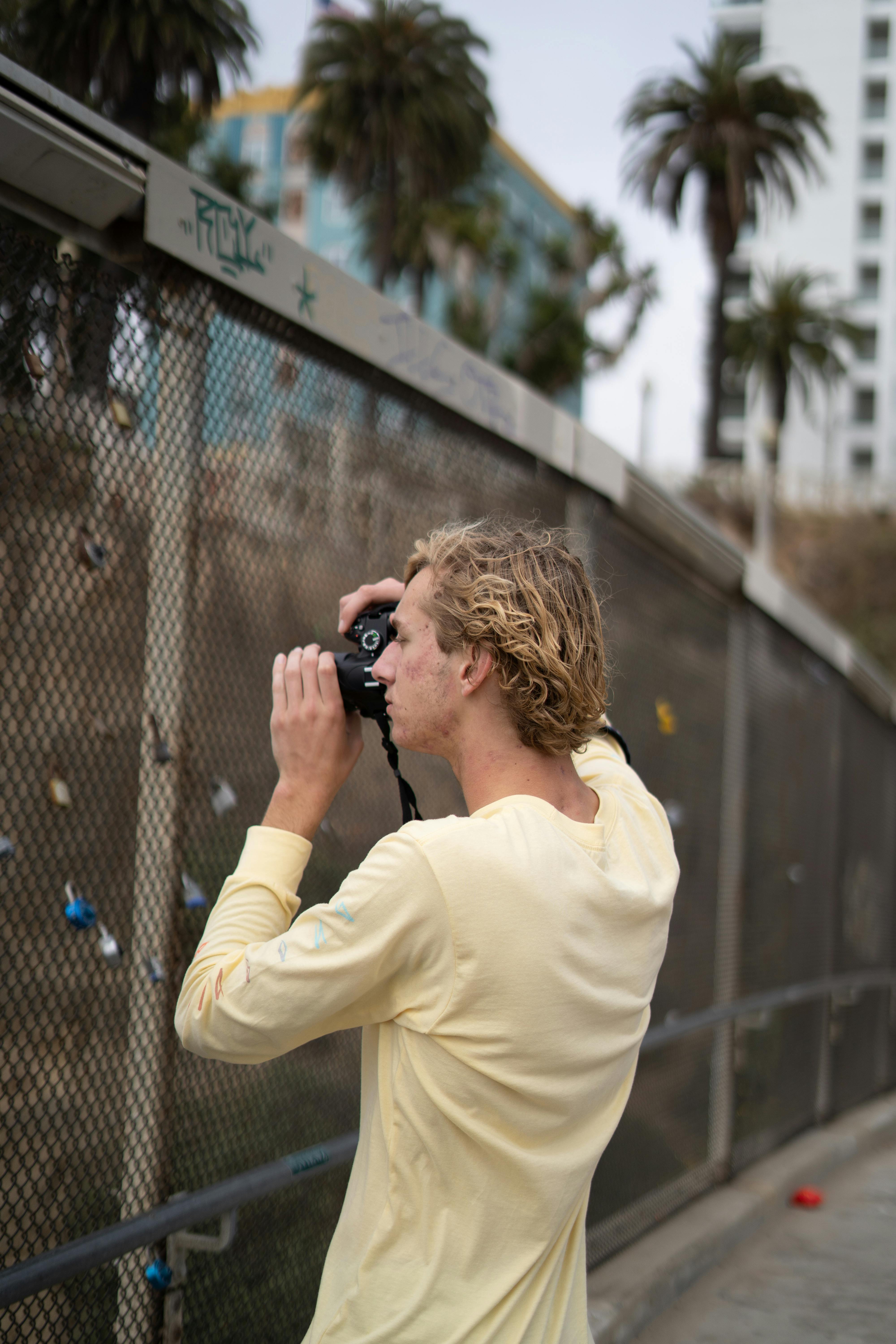 Man Using Camera · Free Stock Photo
