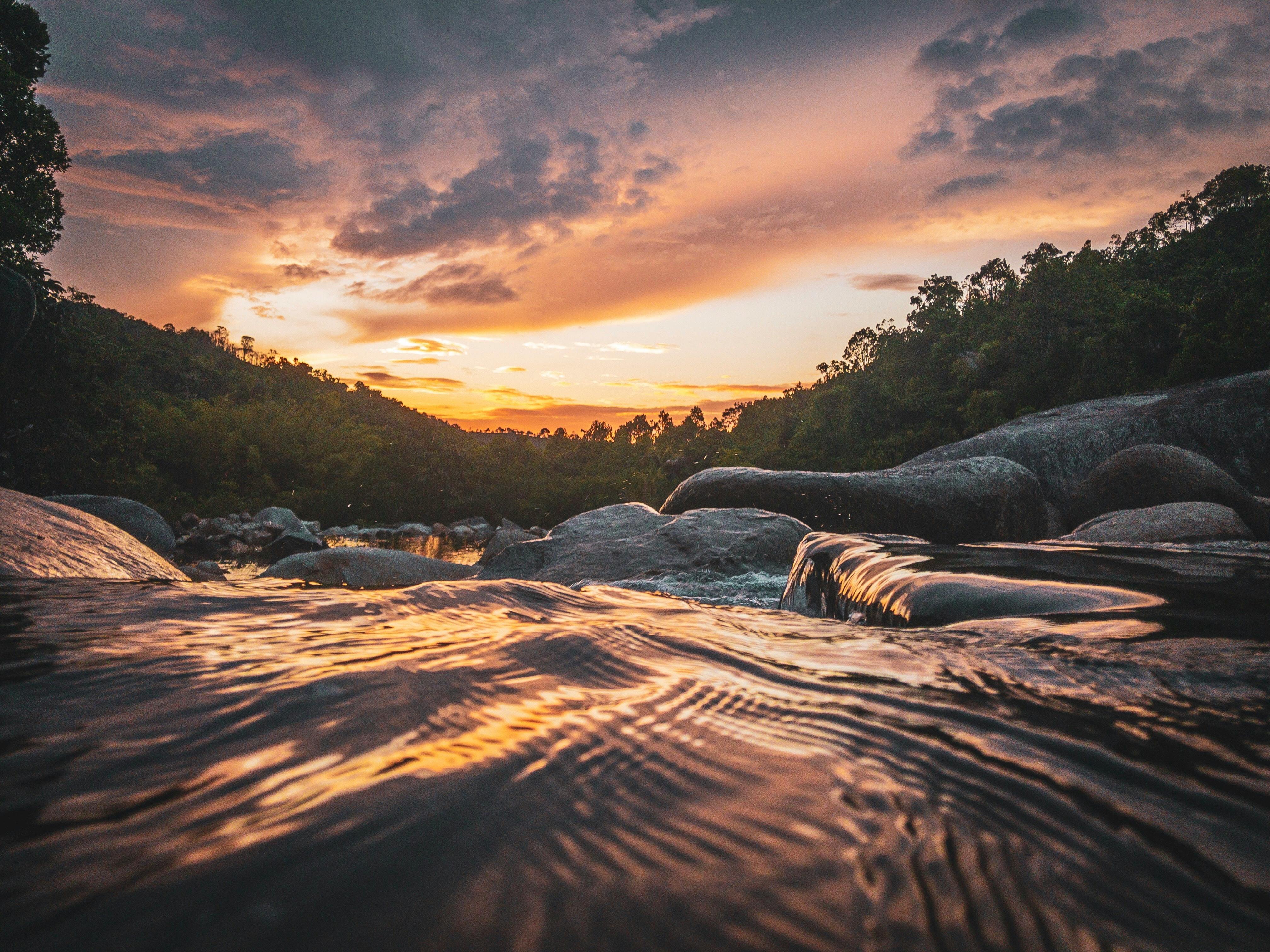 Large Body of Water Stream during Dawn · Free Stock Photo