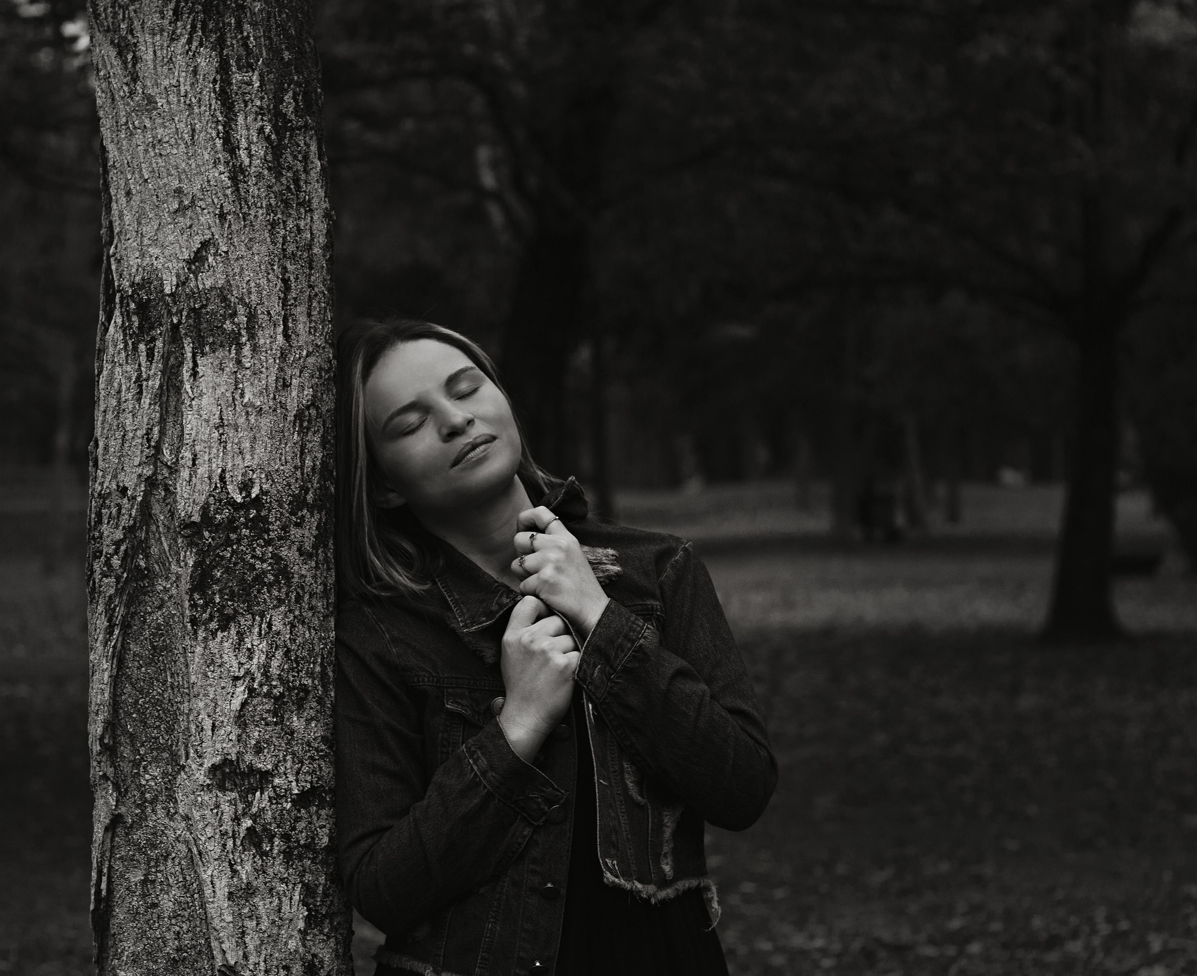 Woman Looking from behind Tree · Free Stock Photo