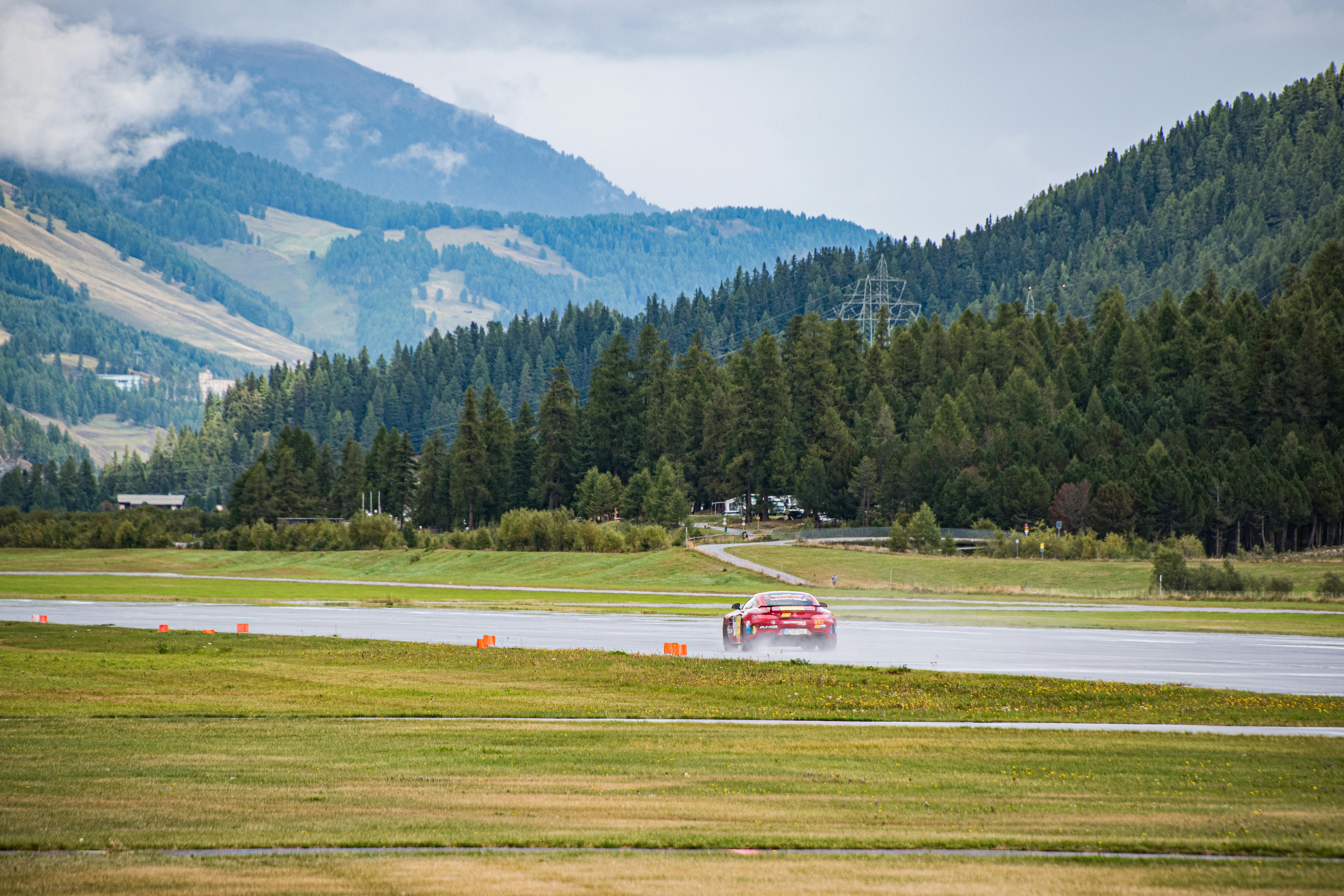 Racing Car on Speed Test on Wet Straight · Free Stock Photo