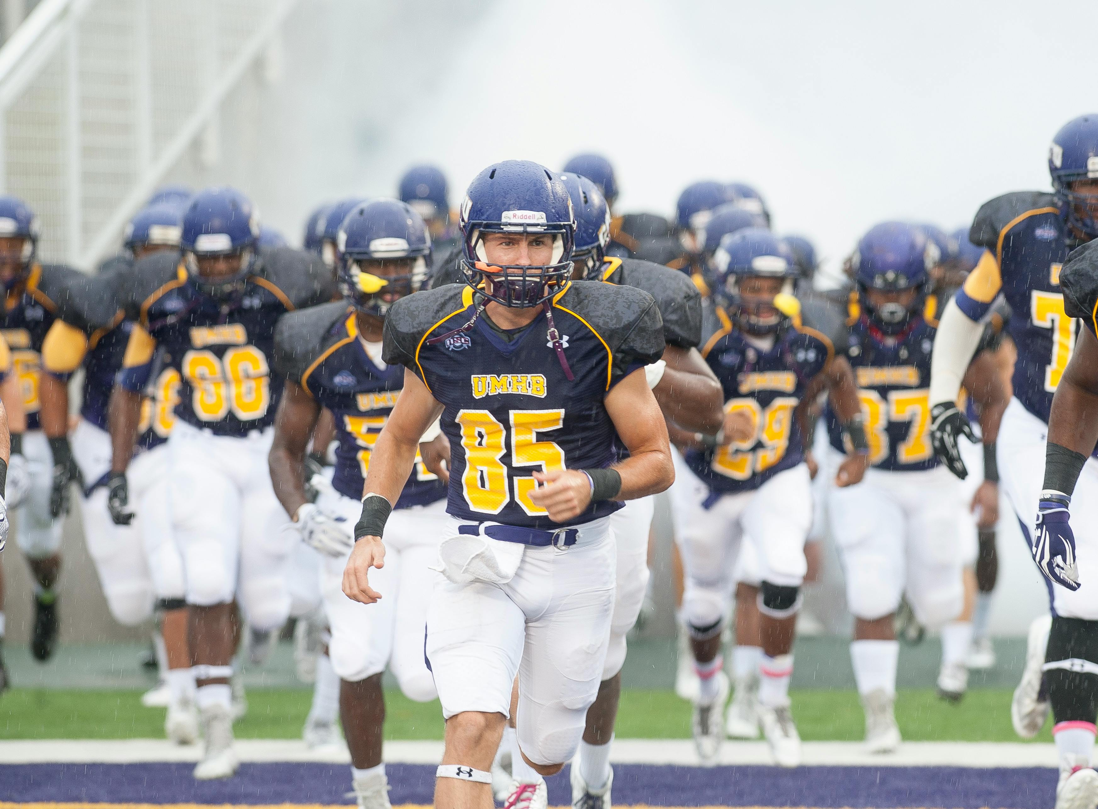 Football Players in Football Field · Free Stock Photo