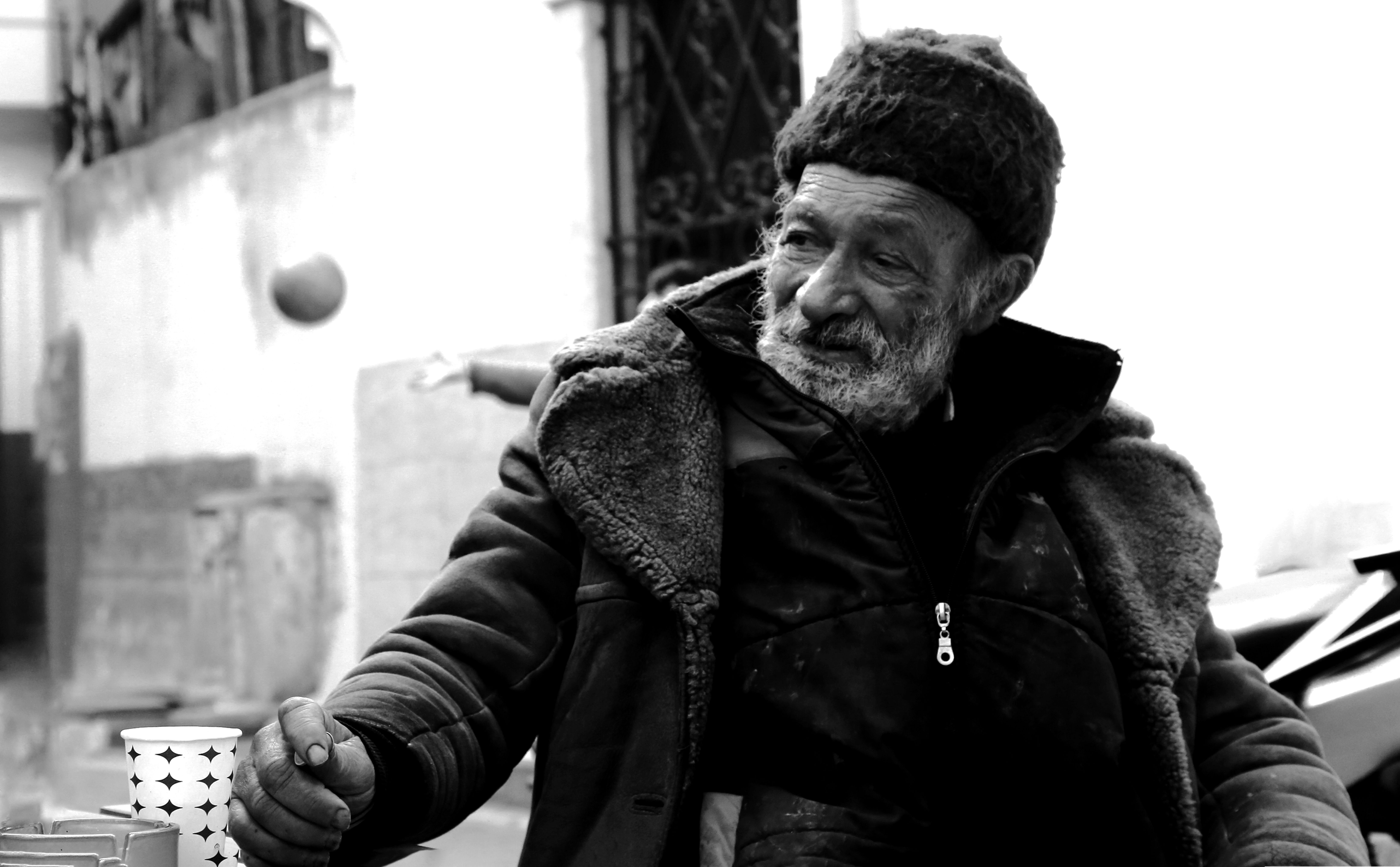 Elderly Man with Hat Holding String · Free Stock Photo