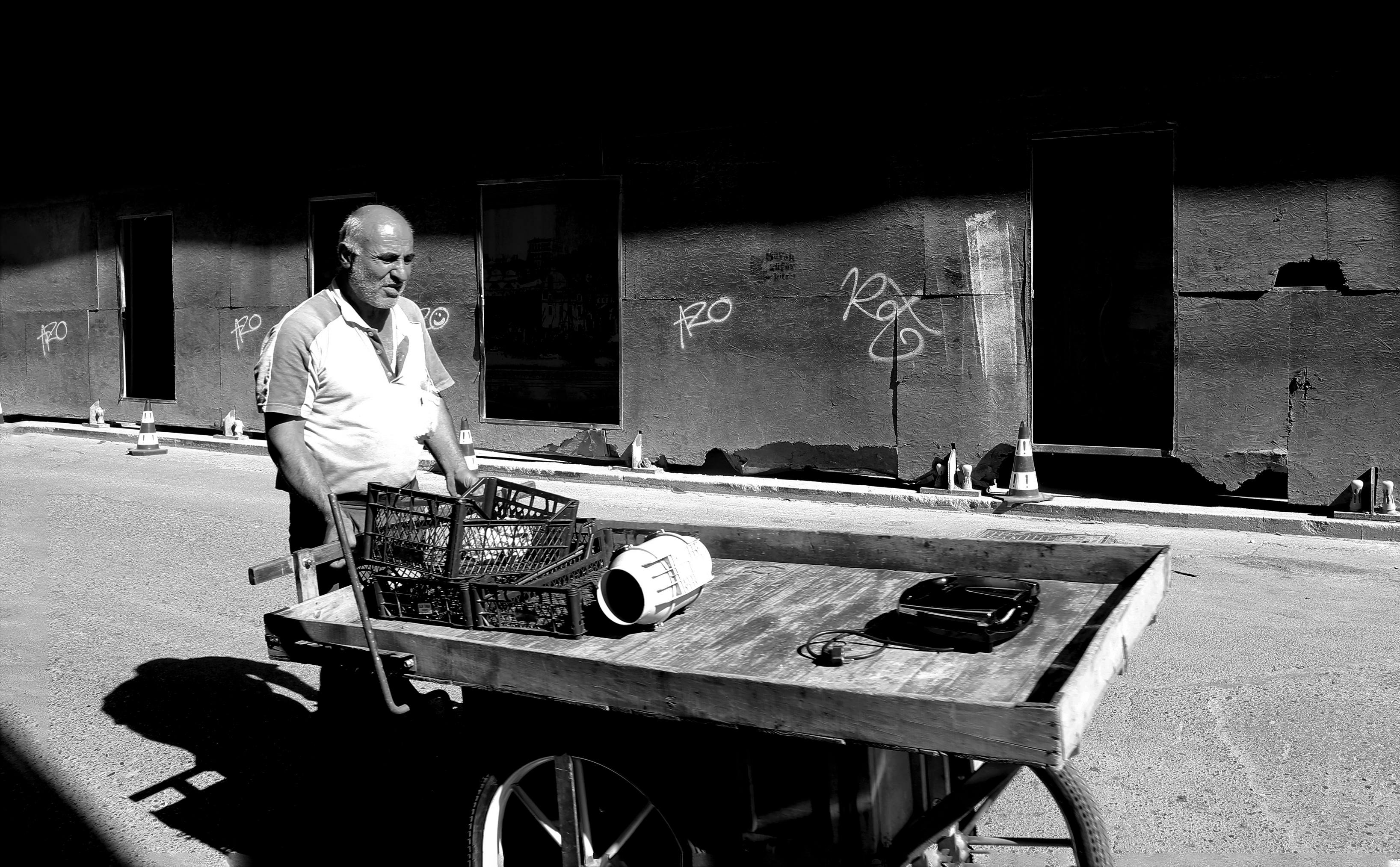 Man Pushing Cart · Free Stock Photo