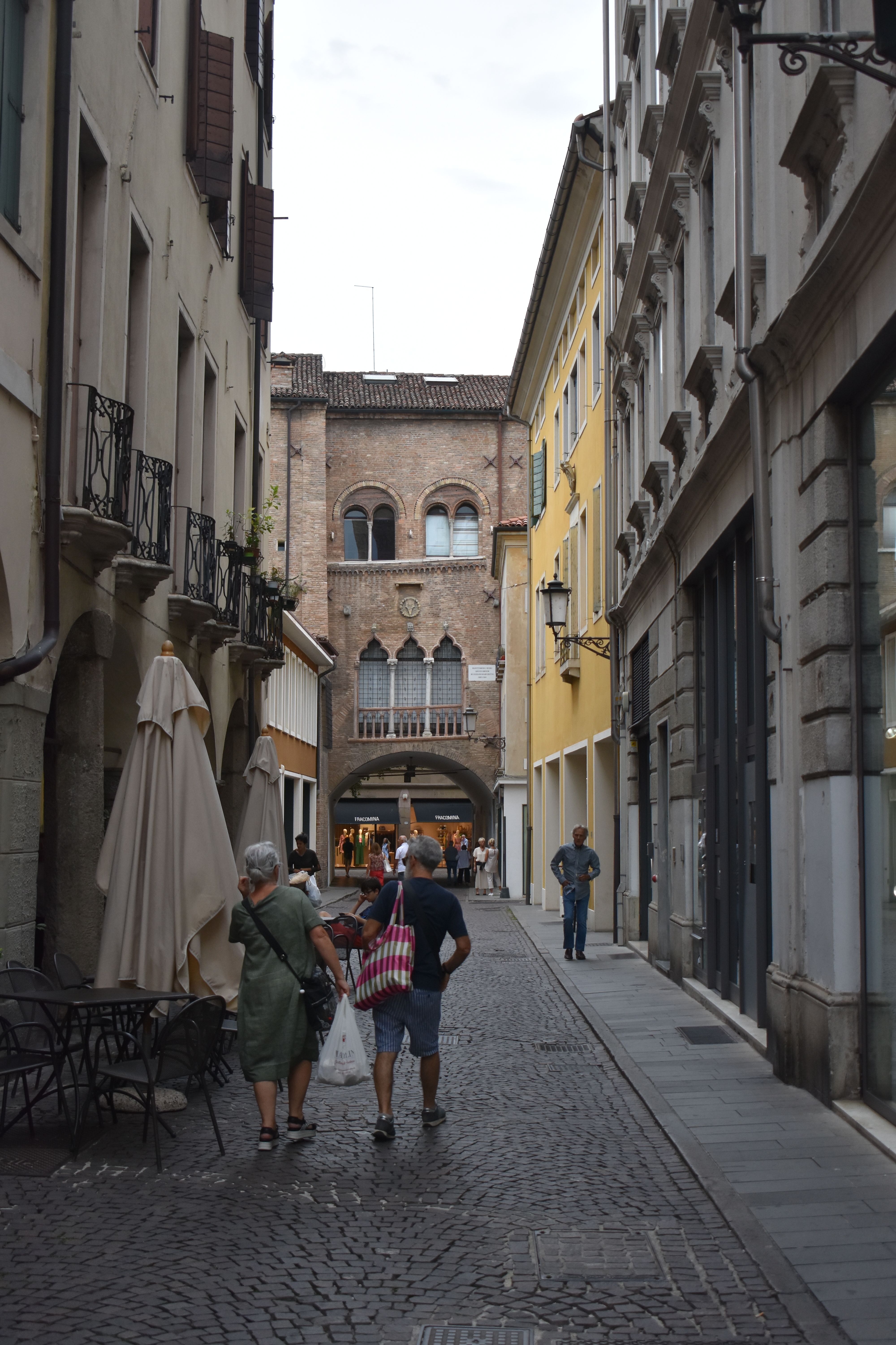 People Standing on a Narrow Street · Free Stock Photo