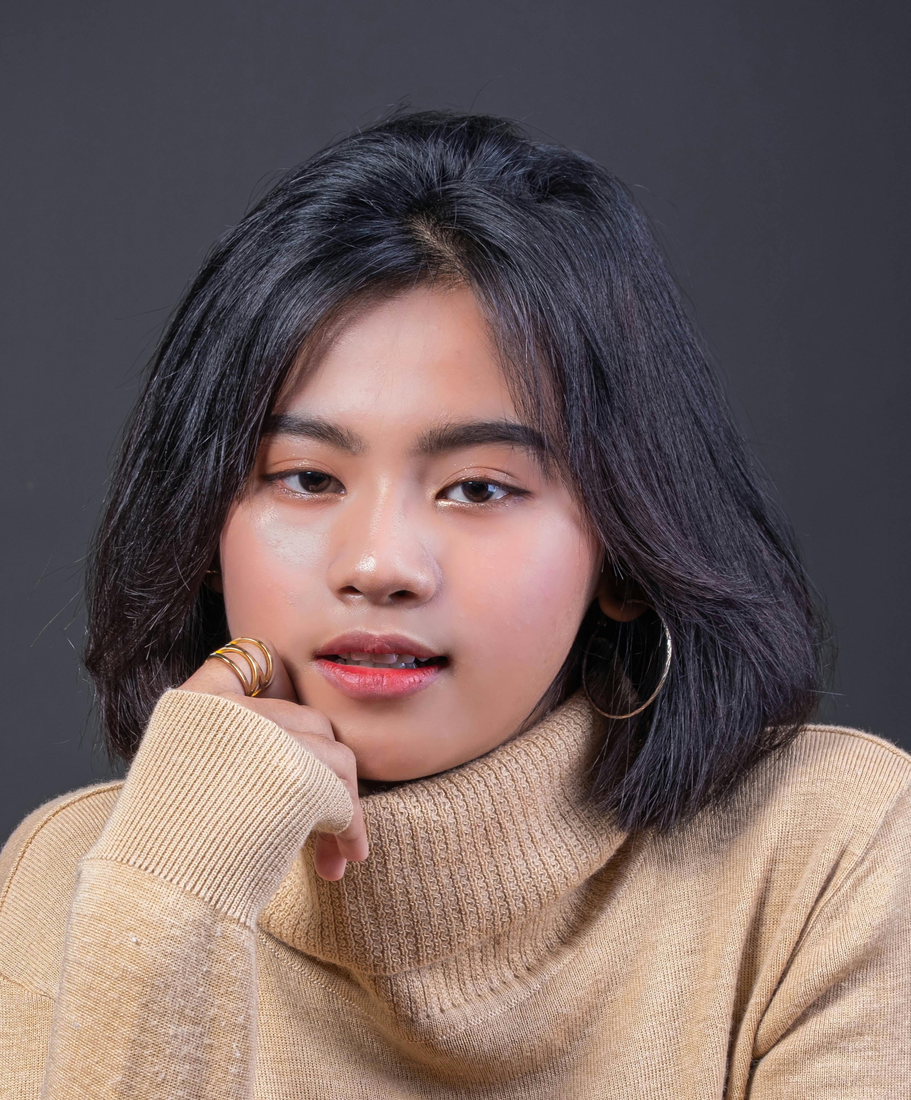 Portrait of Woman on Blue Neon Back · Free Stock Photo