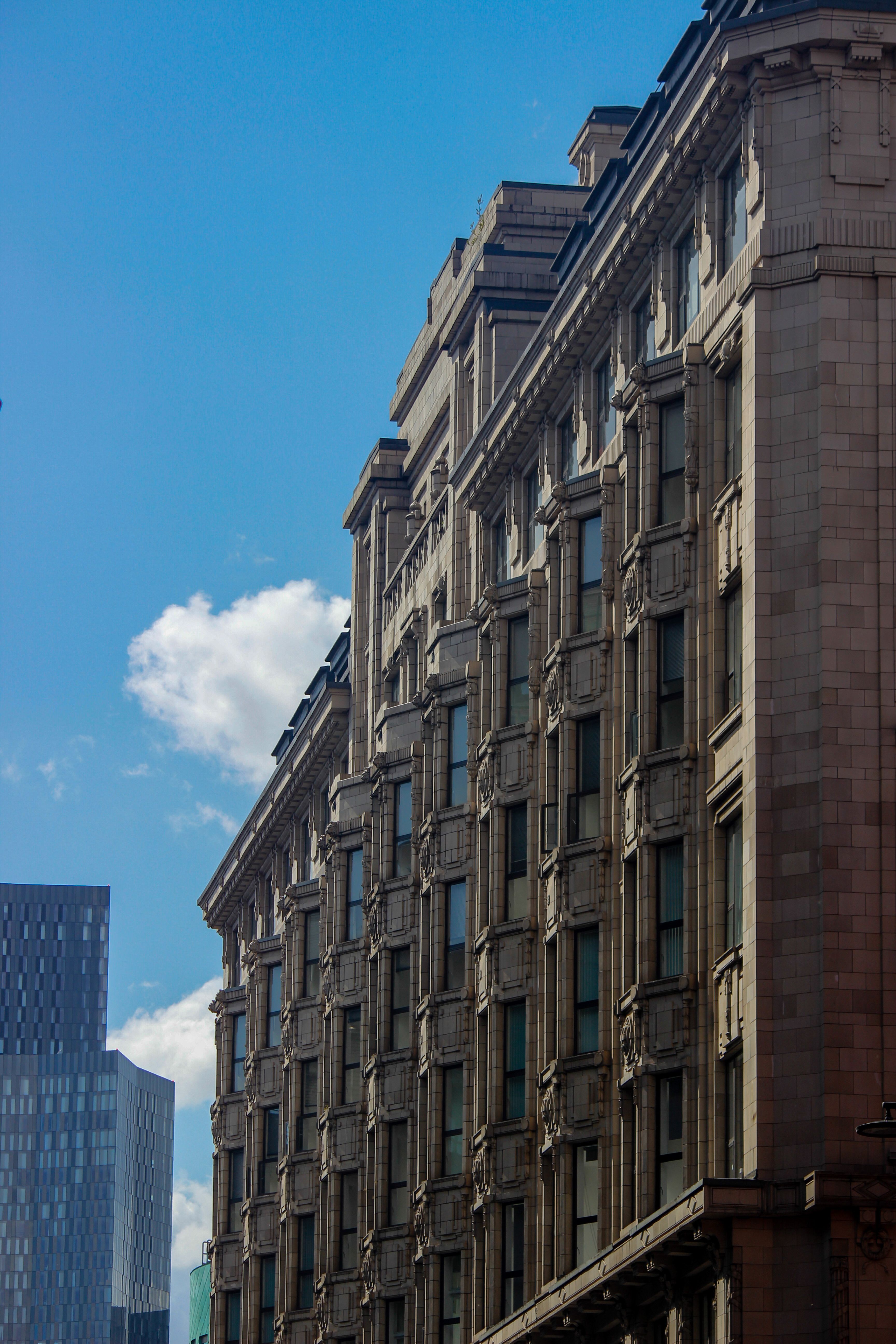 Brown Concrete Building Under Blue Sky · Free Stock Photo