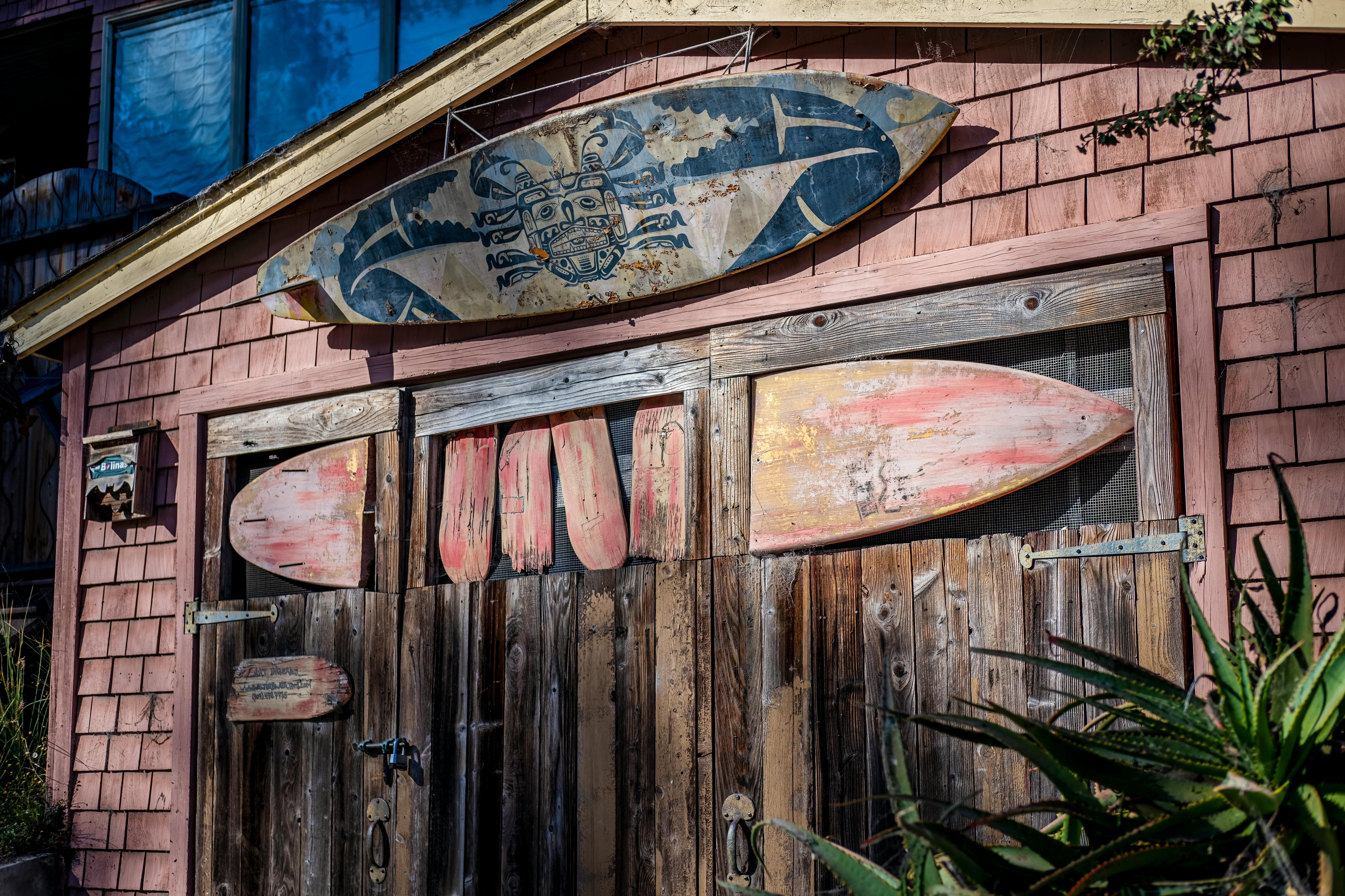 An Abandoned Building with a Surfboard · Free Stock Photo