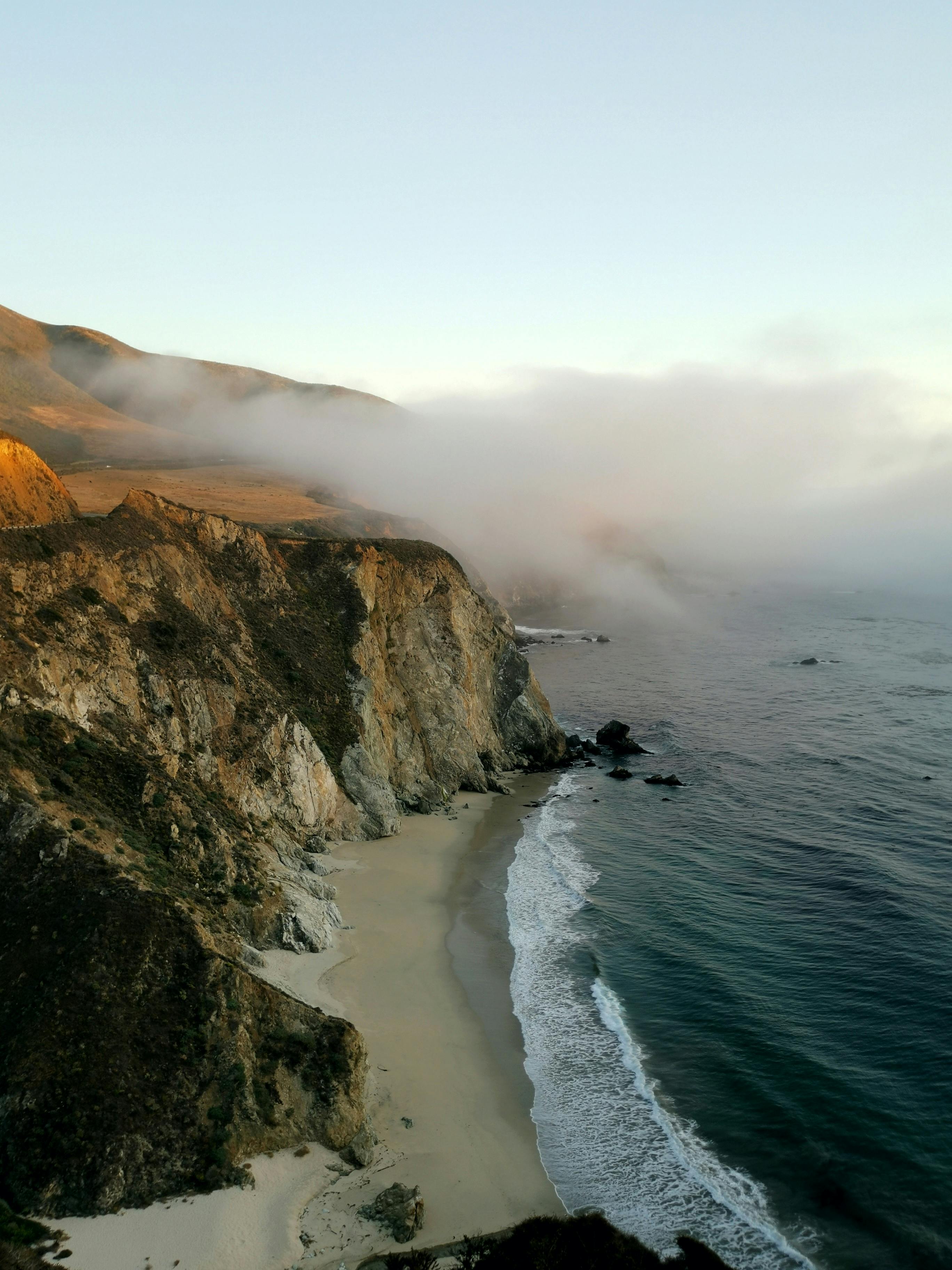 An Aerial Photography of a Rock Formation Near the Beach · Free Stock Photo