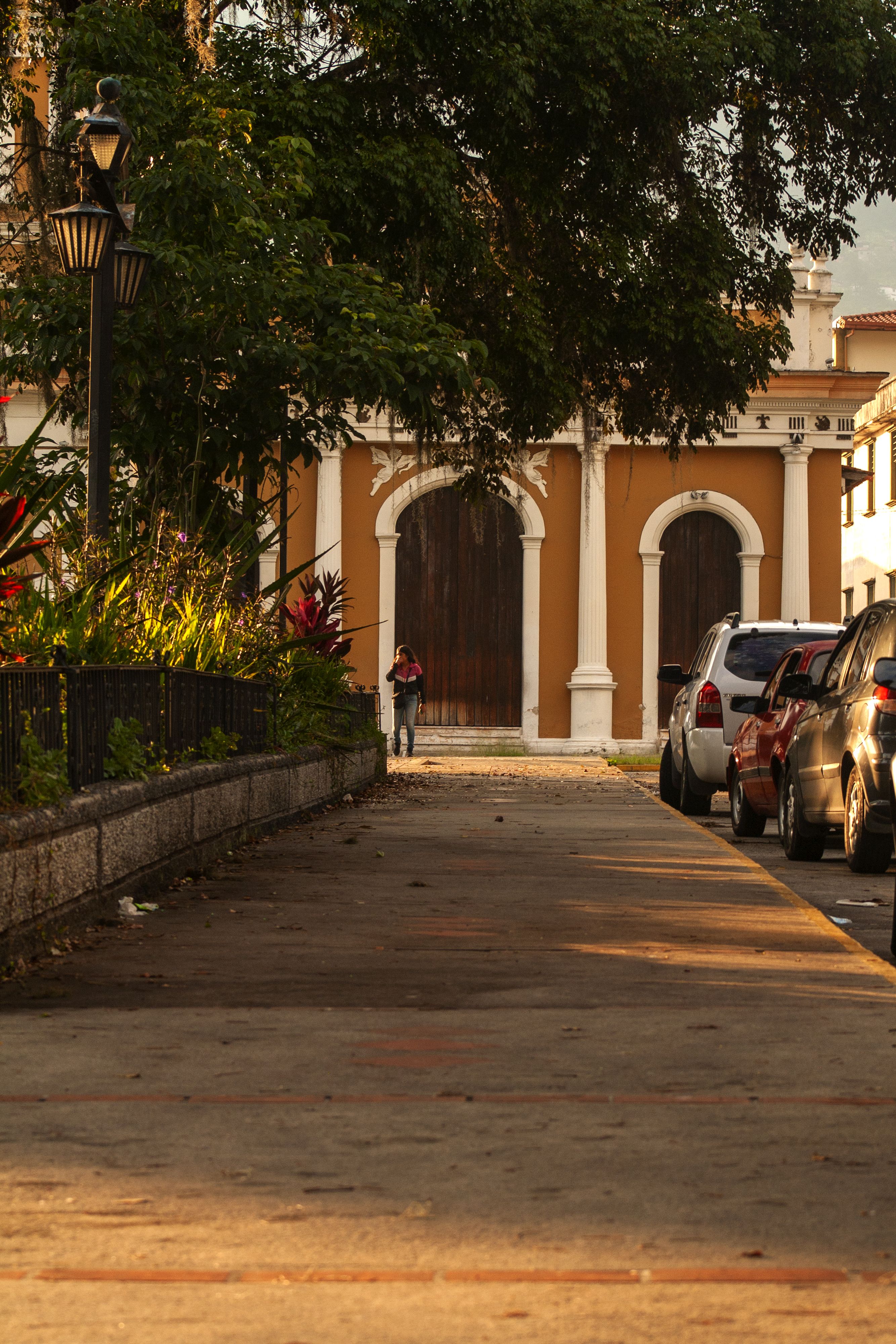 A Mahindra Thar Parked near a Red Gate · Free Stock Photo