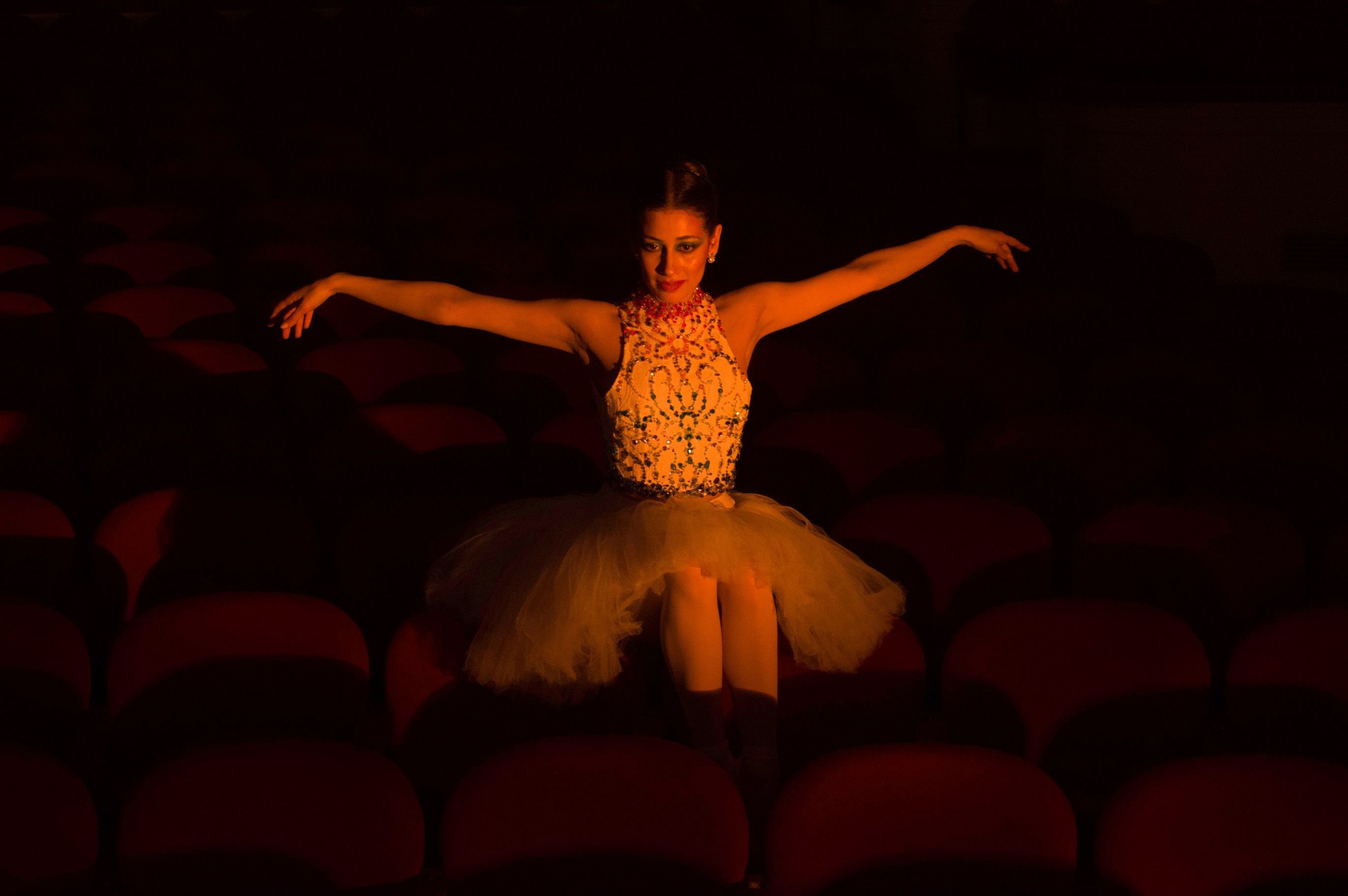 Ballerina Sitting on Seats at Opera · Free Stock Photo