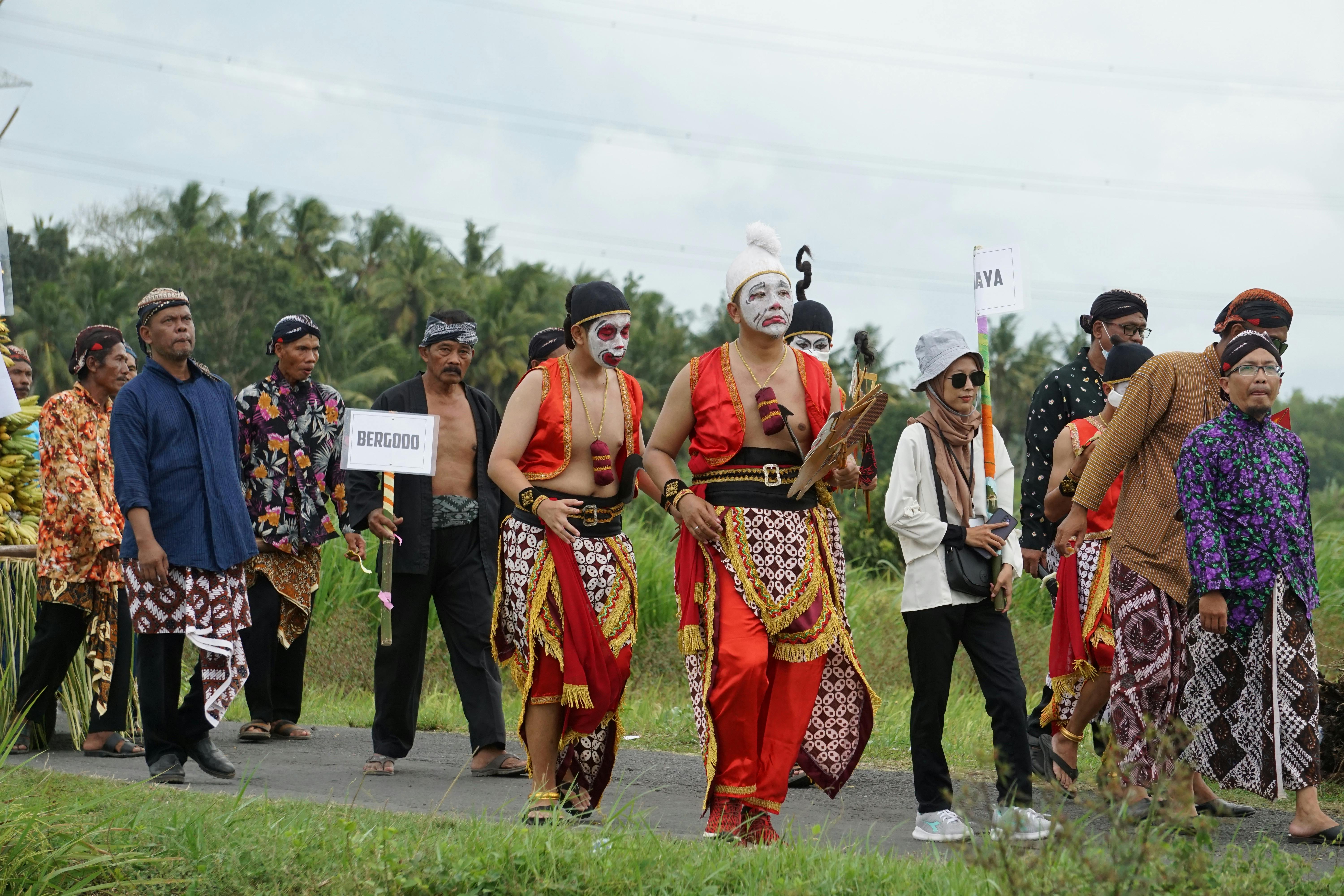 People in Traditional Costumes Walking in Countryside on Ceremony ...