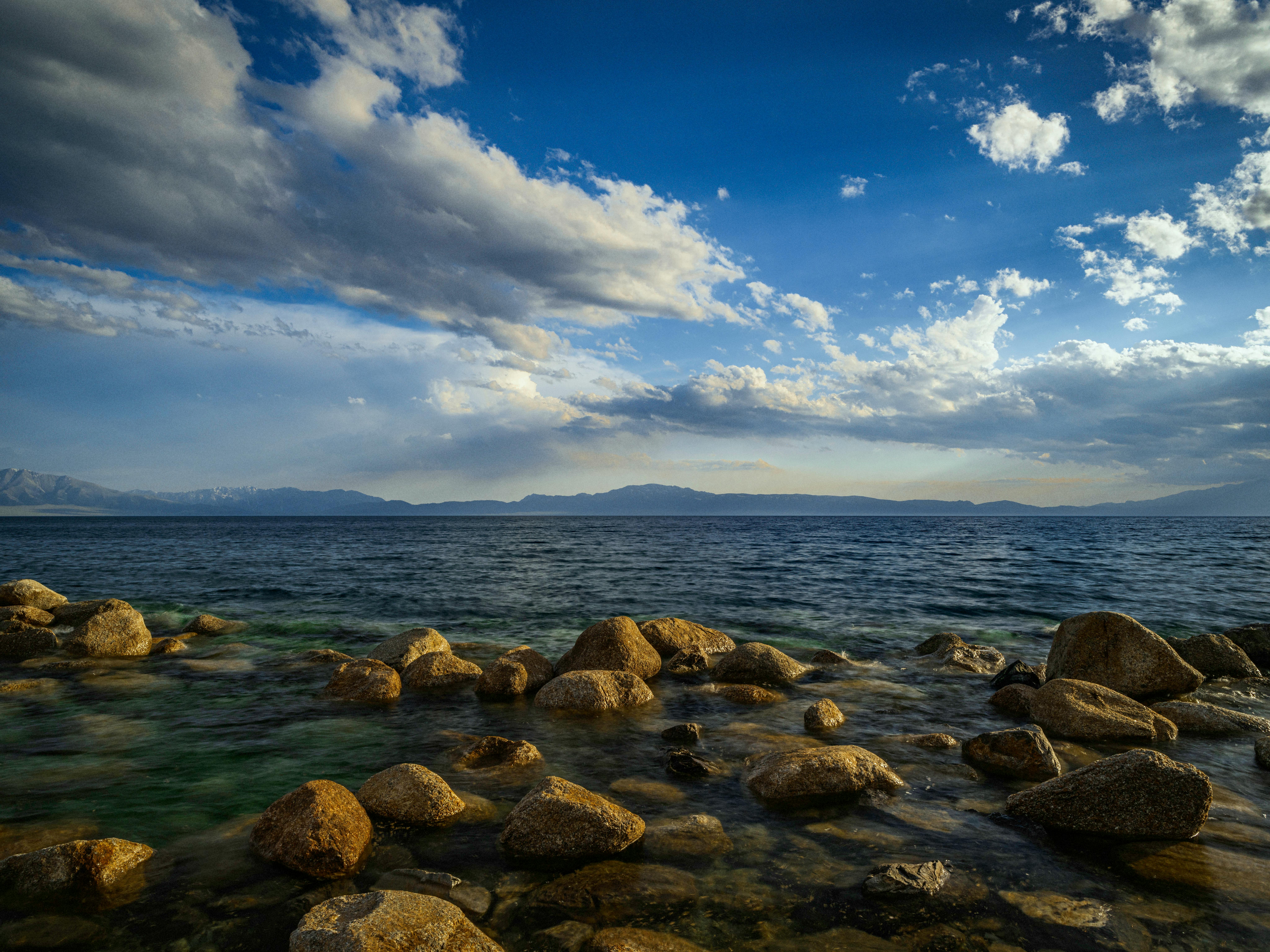Brown Rocks on Seashore · Free Stock Photo