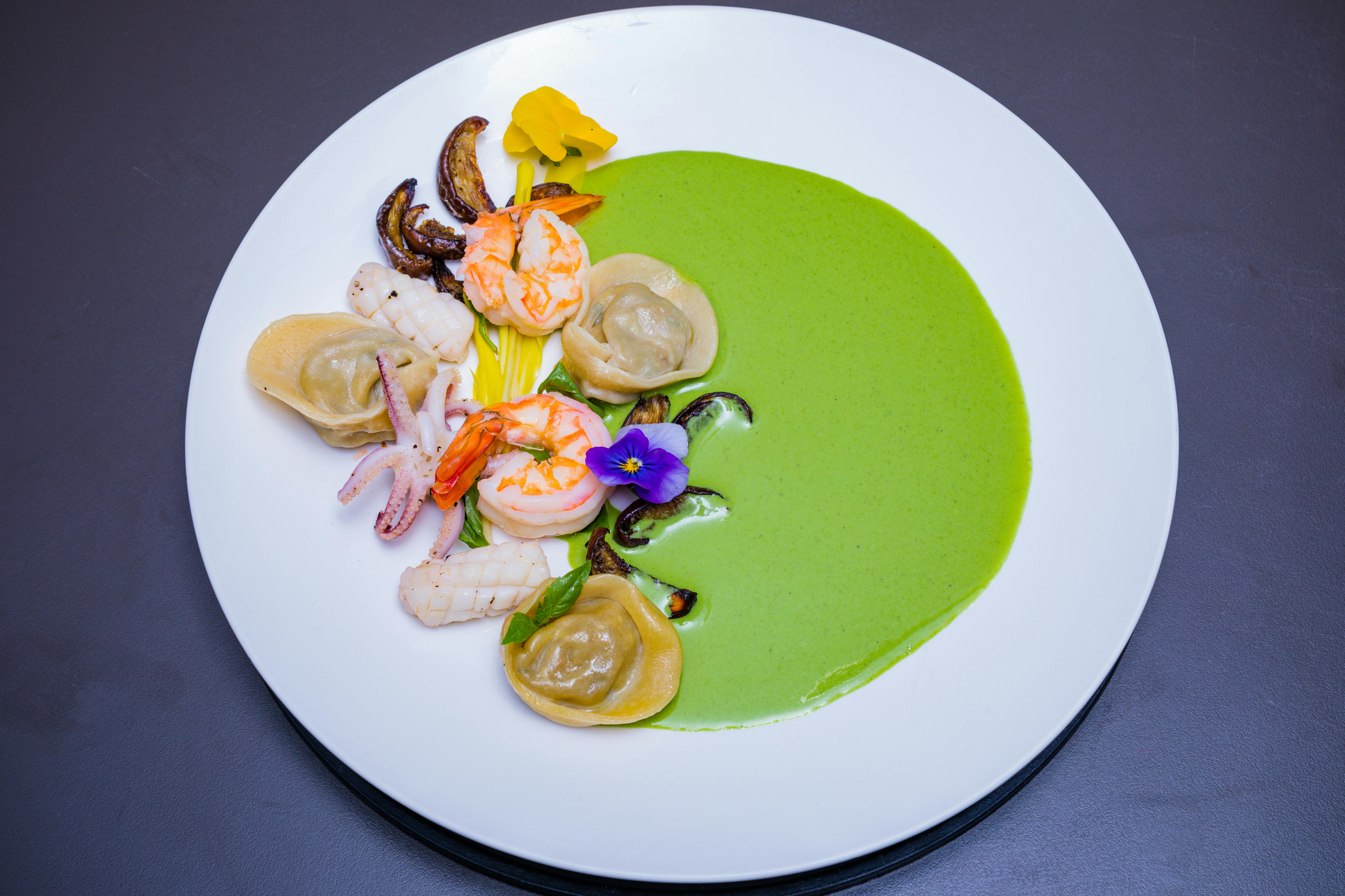 Woman Eating Octopus · Free Stock Photo