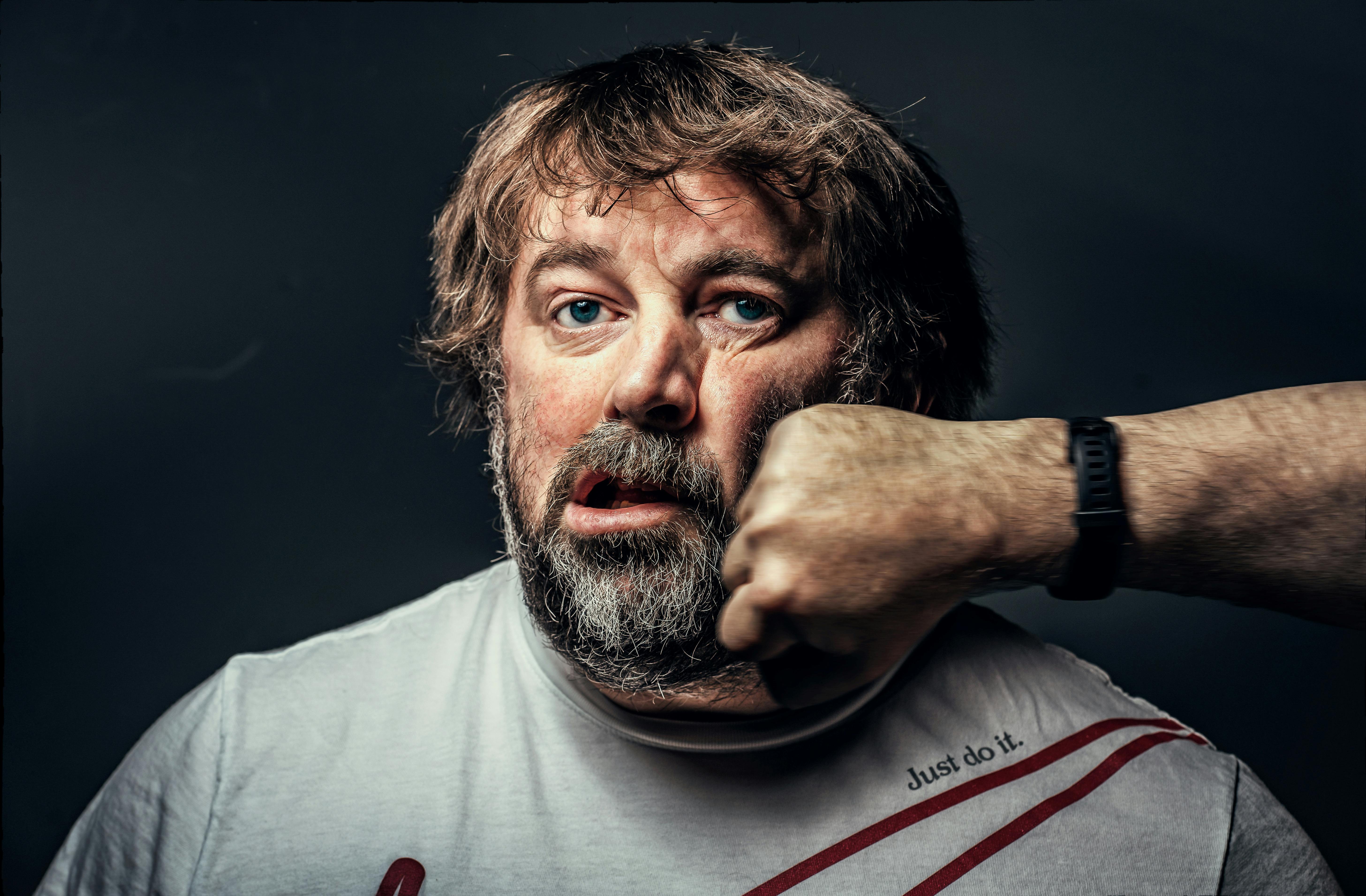 Fist Punching Face · Free Stock Photo