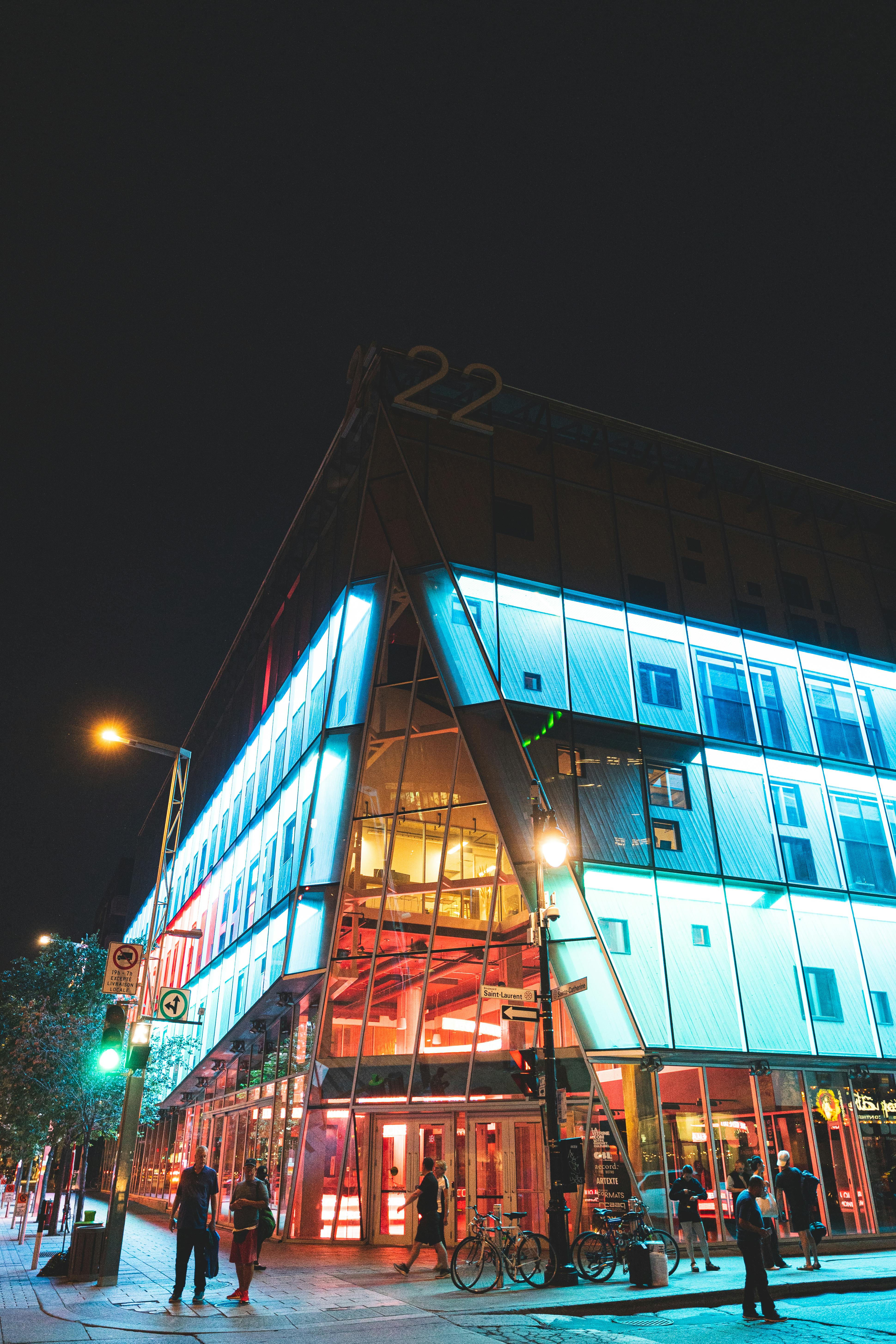 Neon Lighted Building on a Coner Lot during Nighttime · Free Stock Photo