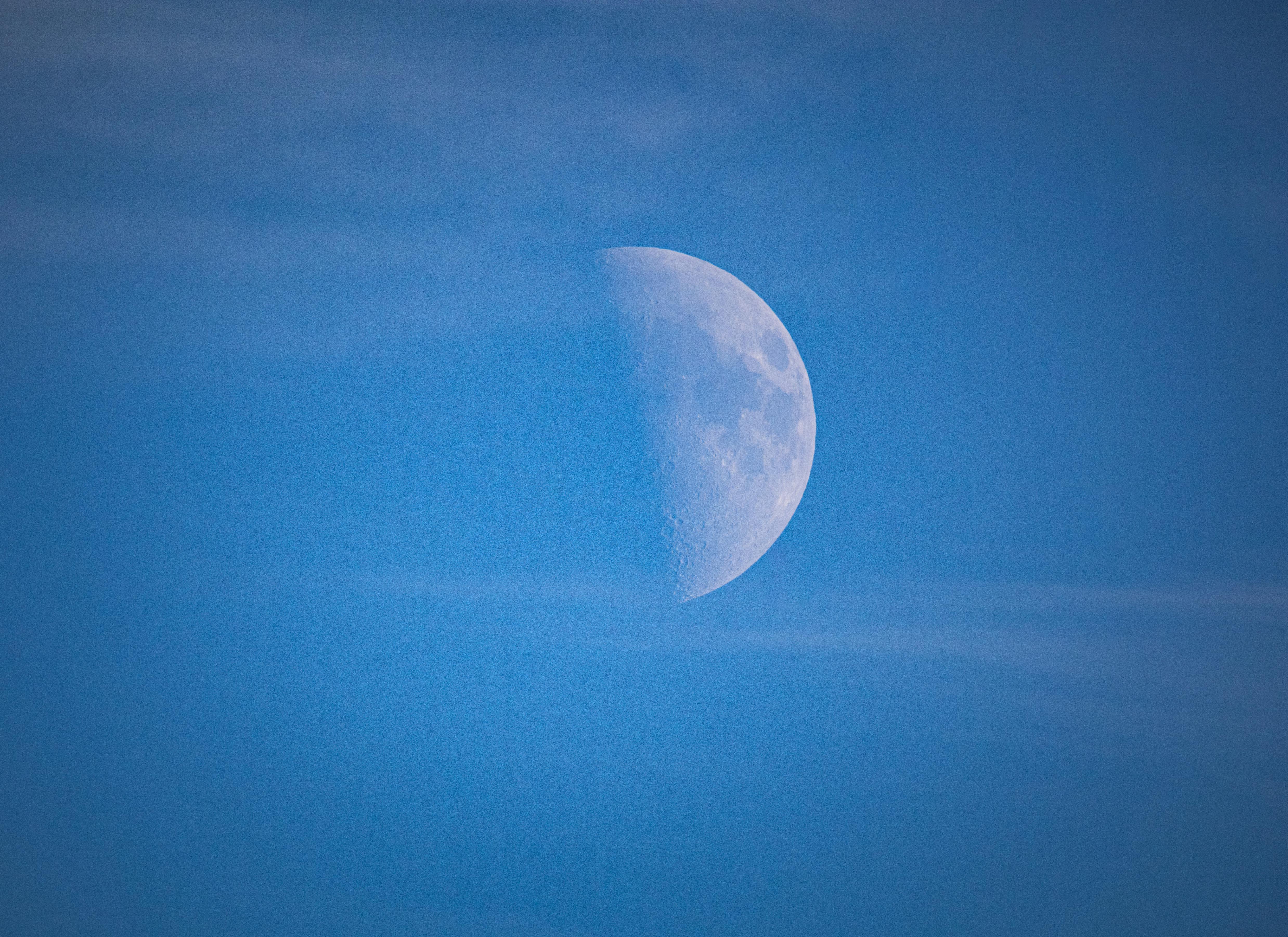 A View of a Half Moon on a Blue Sky · Free Stock Photo