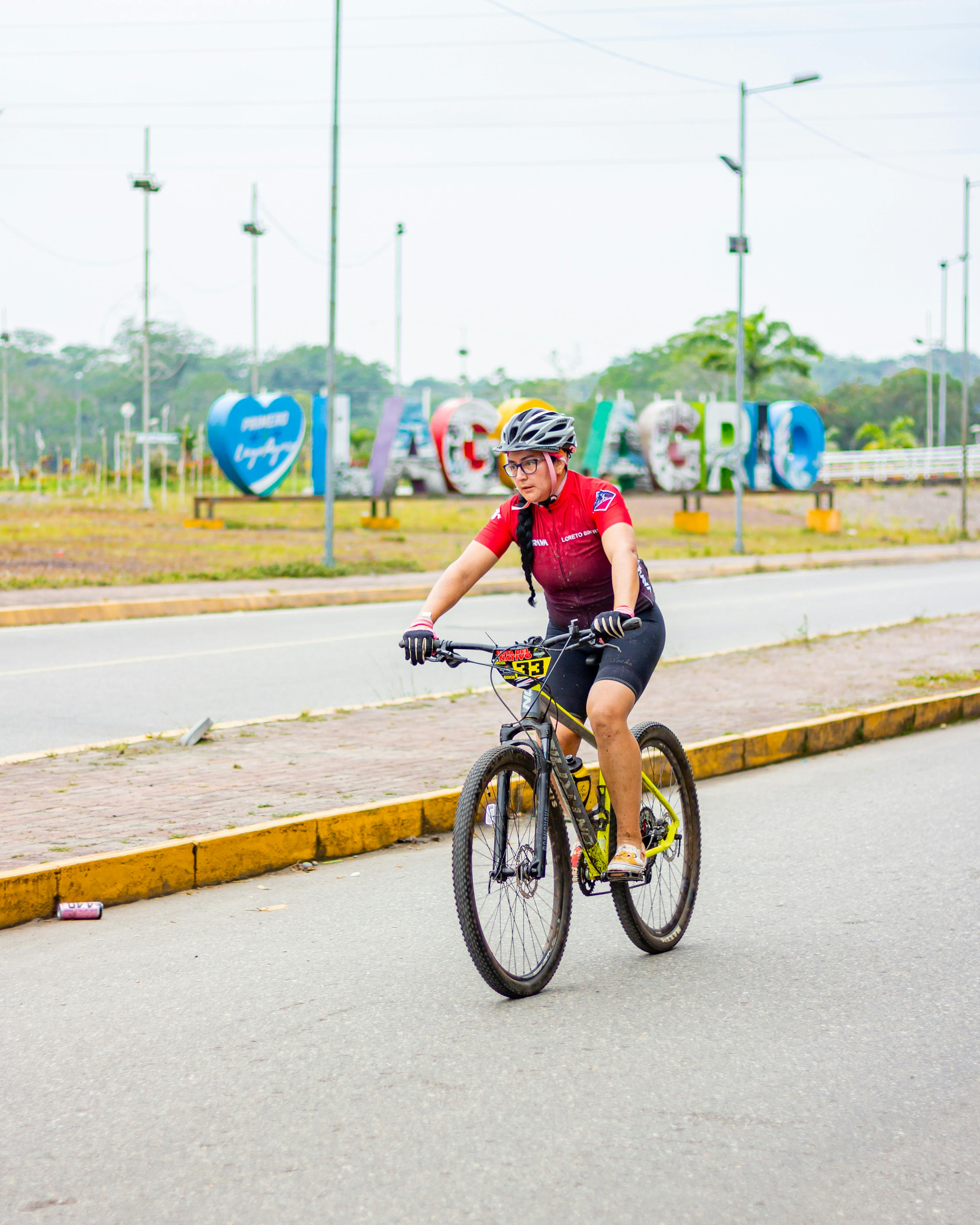 Woman Riding a Bicycle · Free Stock Photo