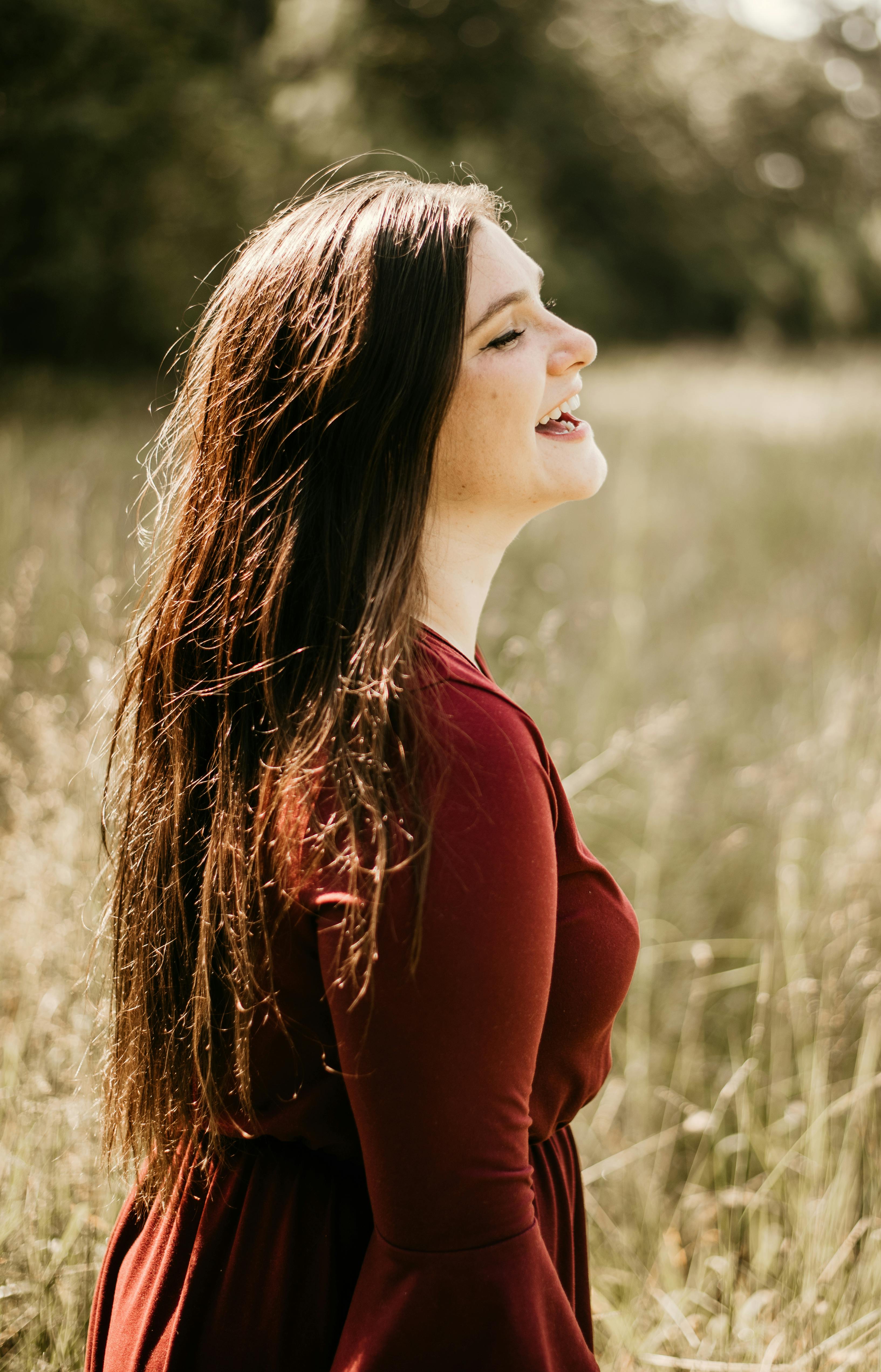 Woman in Red Top Smiling · Free Stock Photo