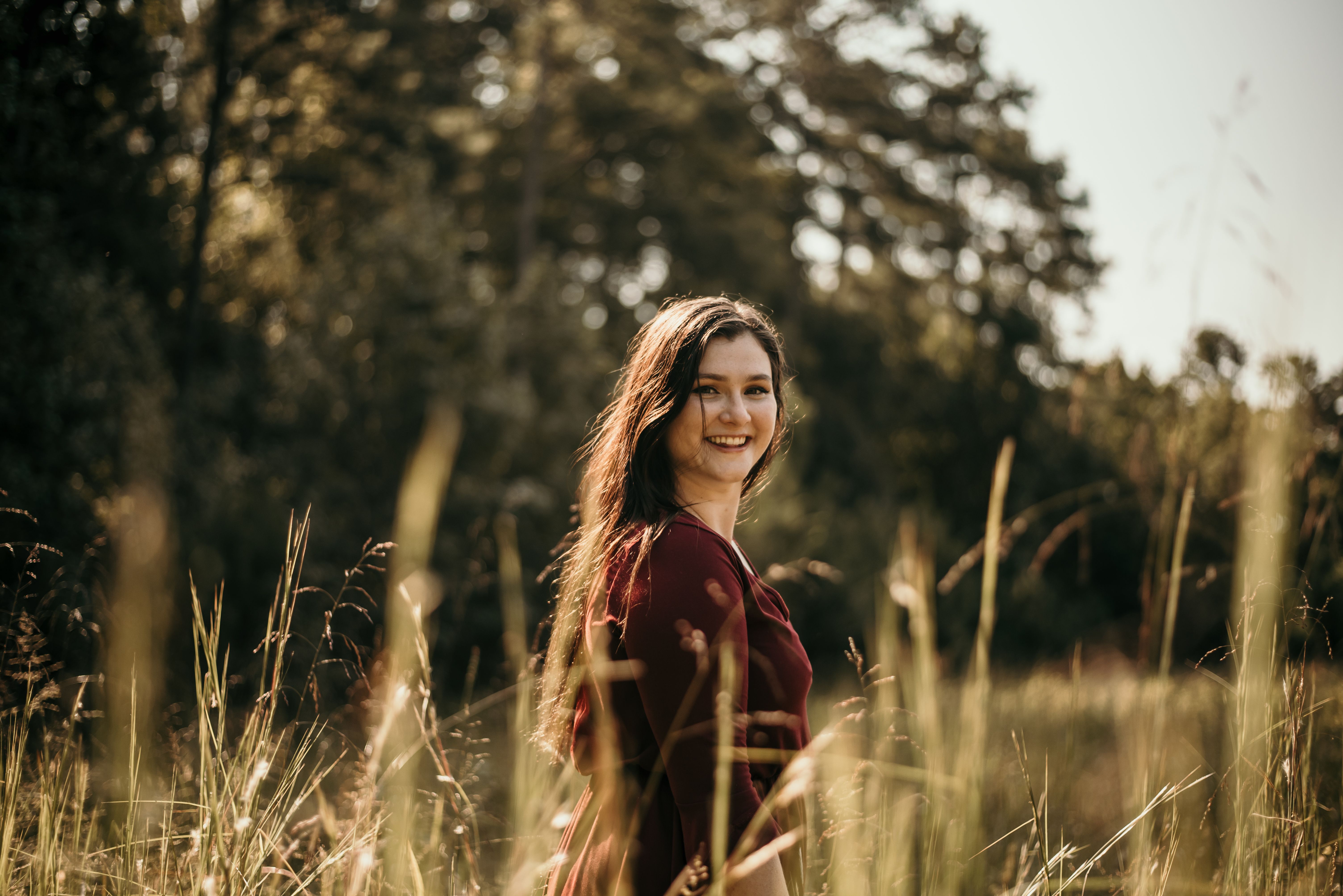 Woman in Red Top Smiling · Free Stock Photo