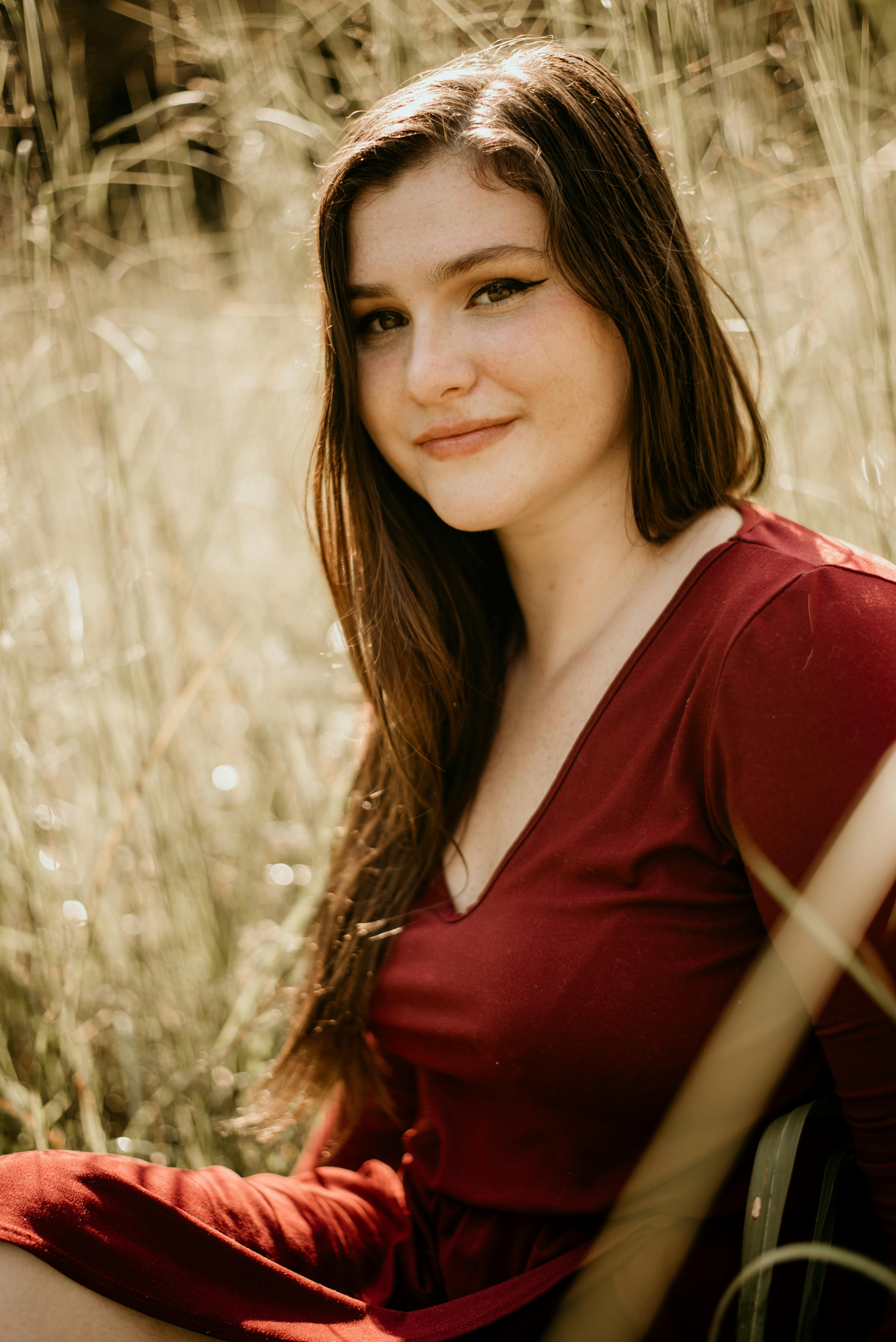 Woman in Red Top Smiling · Free Stock Photo