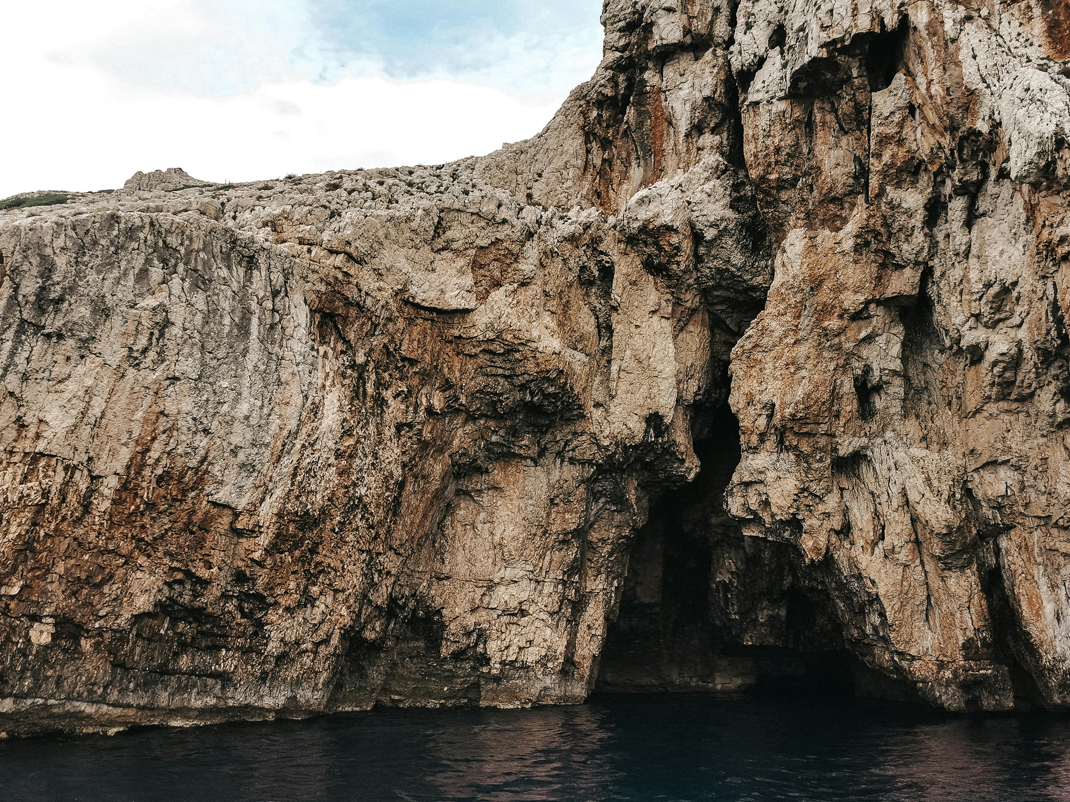 Cave in Cliff · Free Stock Photo