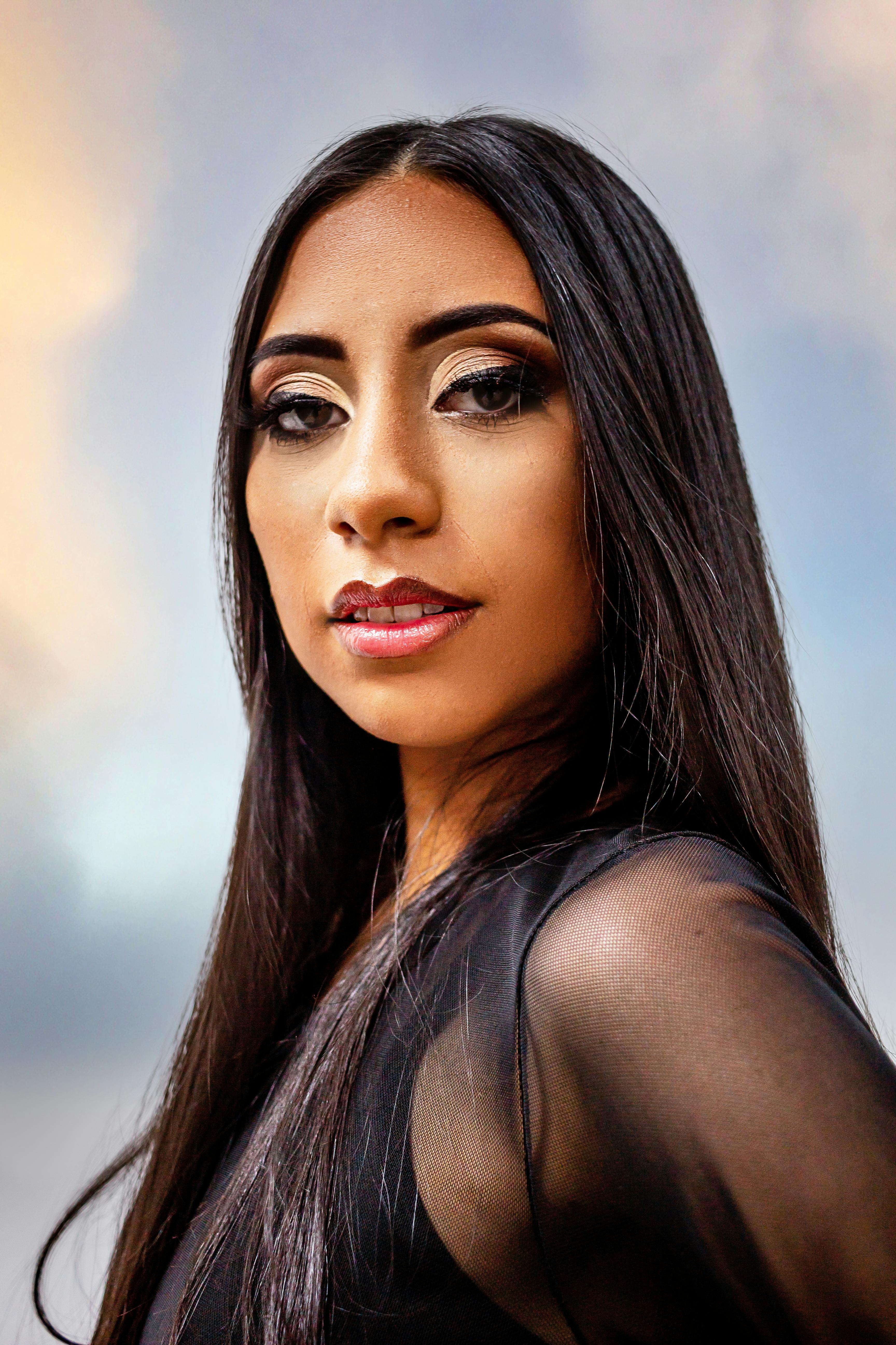 Woman in Black Blazer Taking Selfie · Free Stock Photo