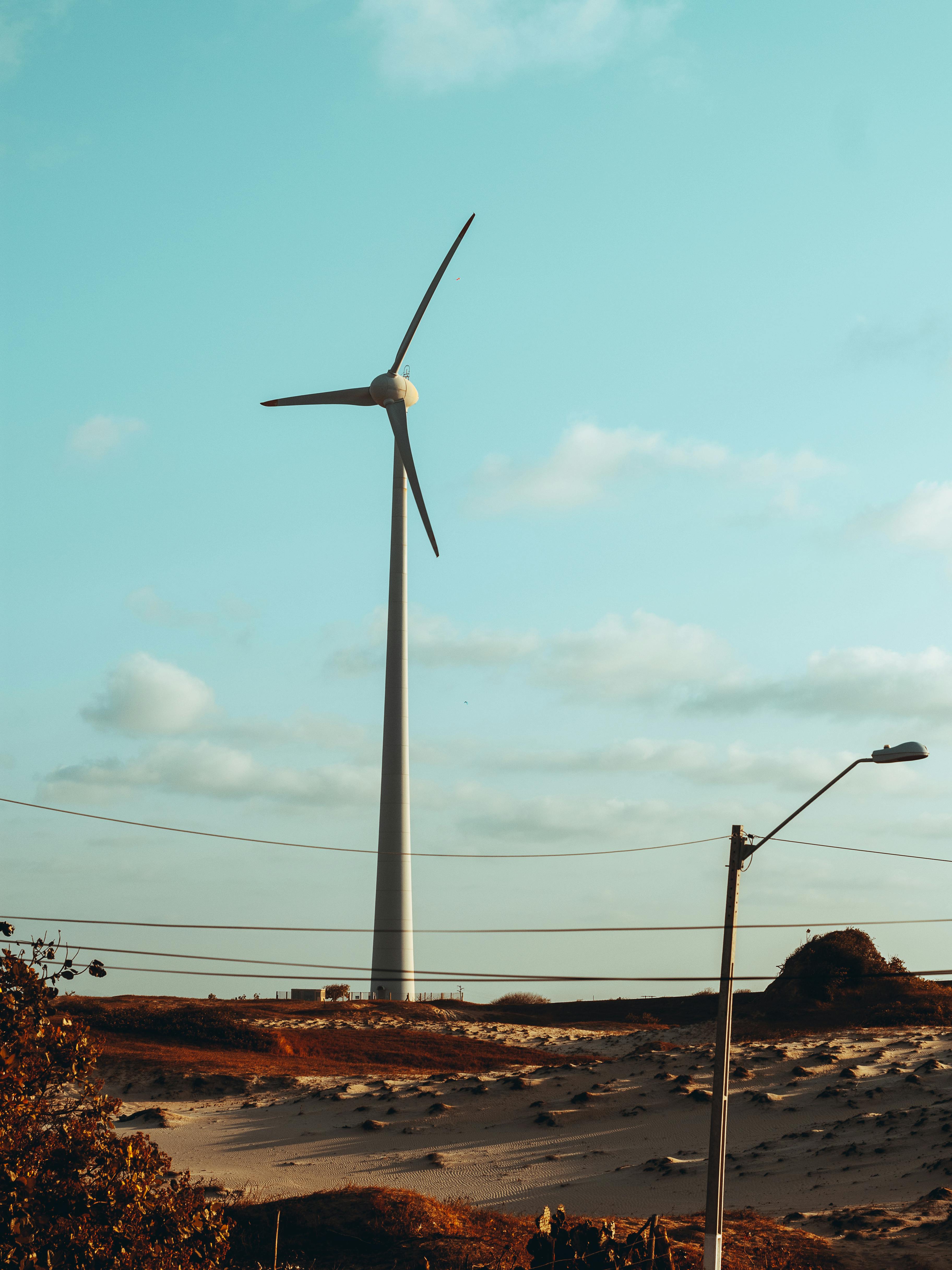 White Wind Turbine Under Blue Sky · Free Stock Photo