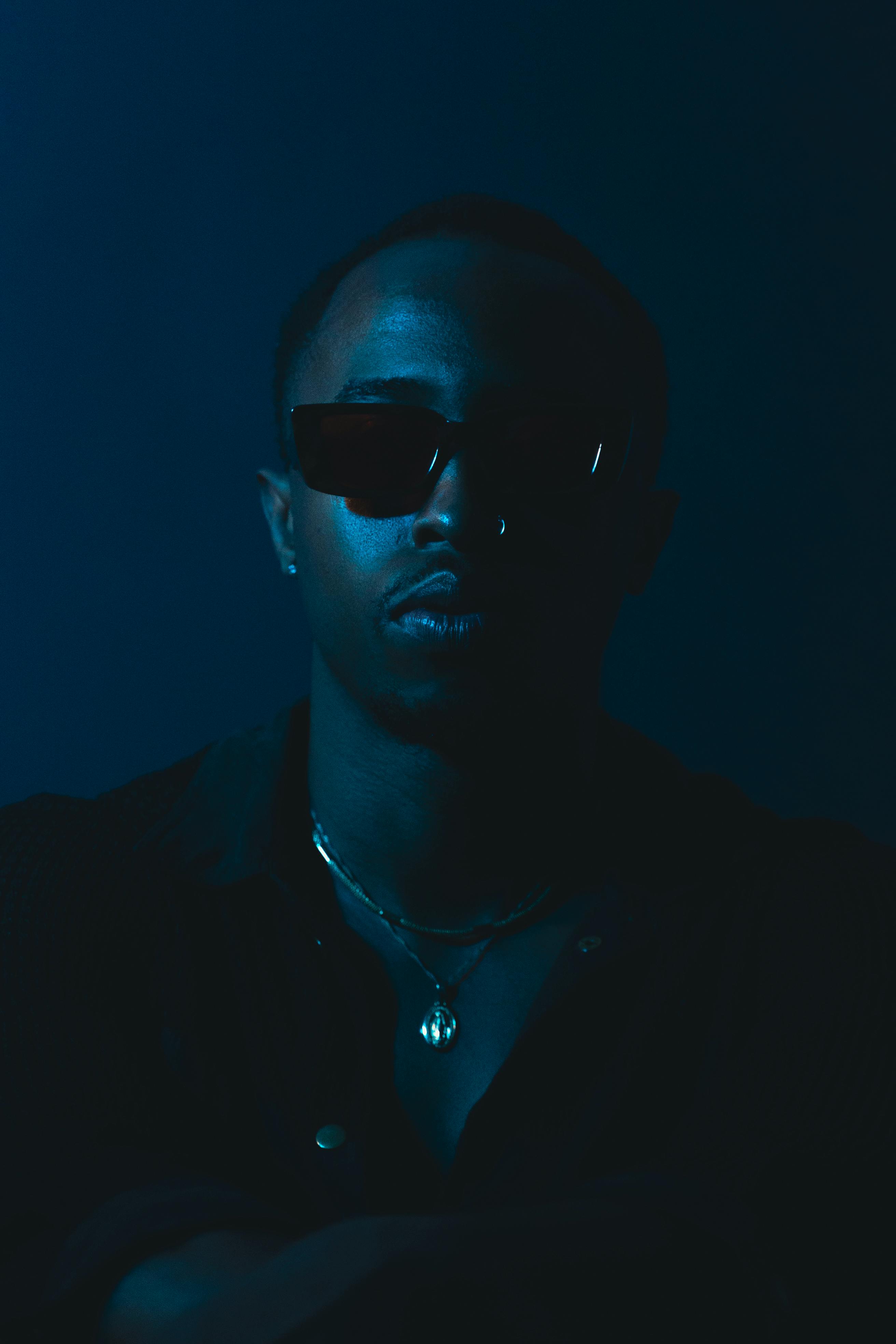 Man's Face in Light Stripe · Free Stock Photo