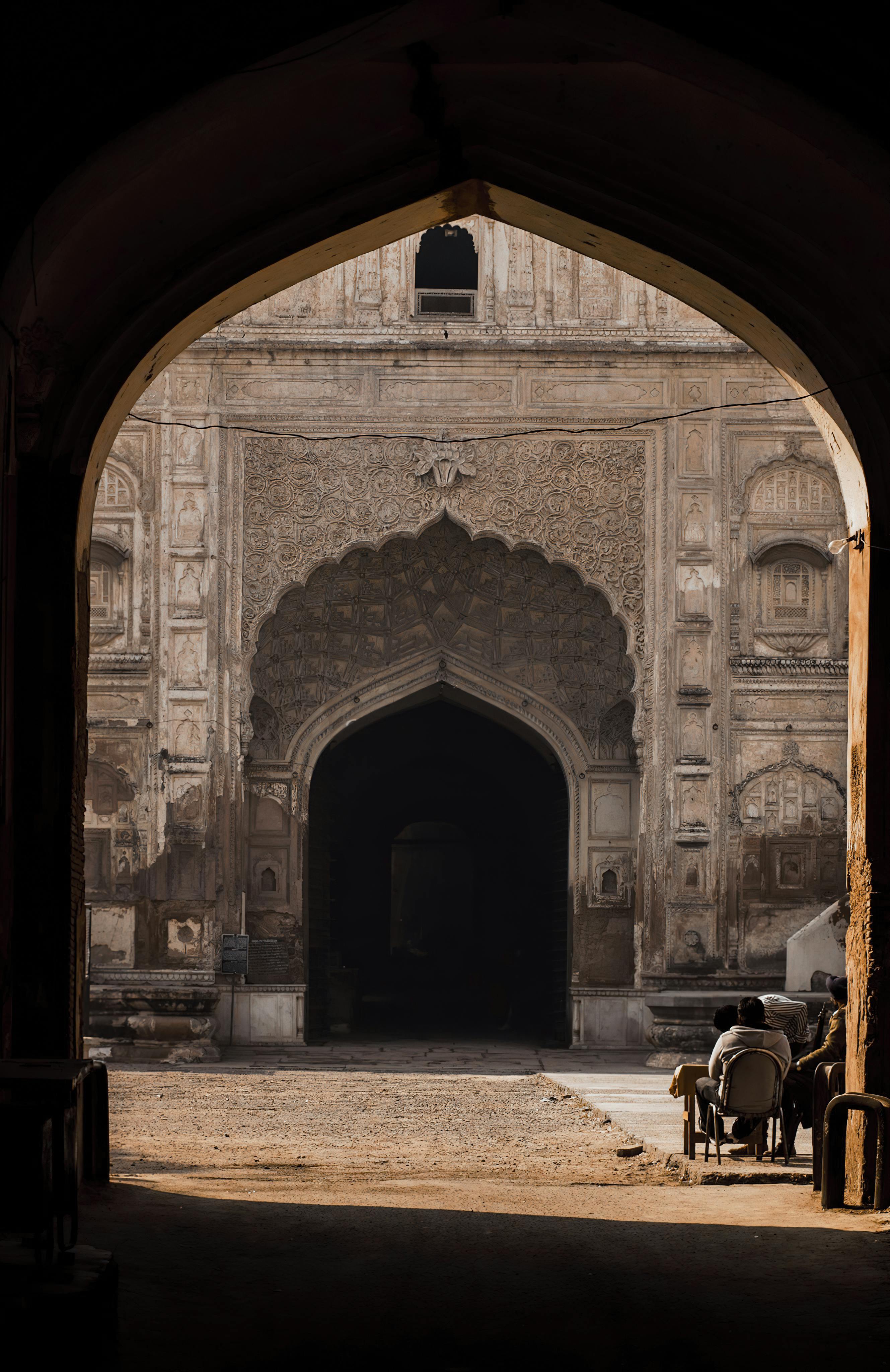 Man Standing On Arc Doorway · Free Stock Photo